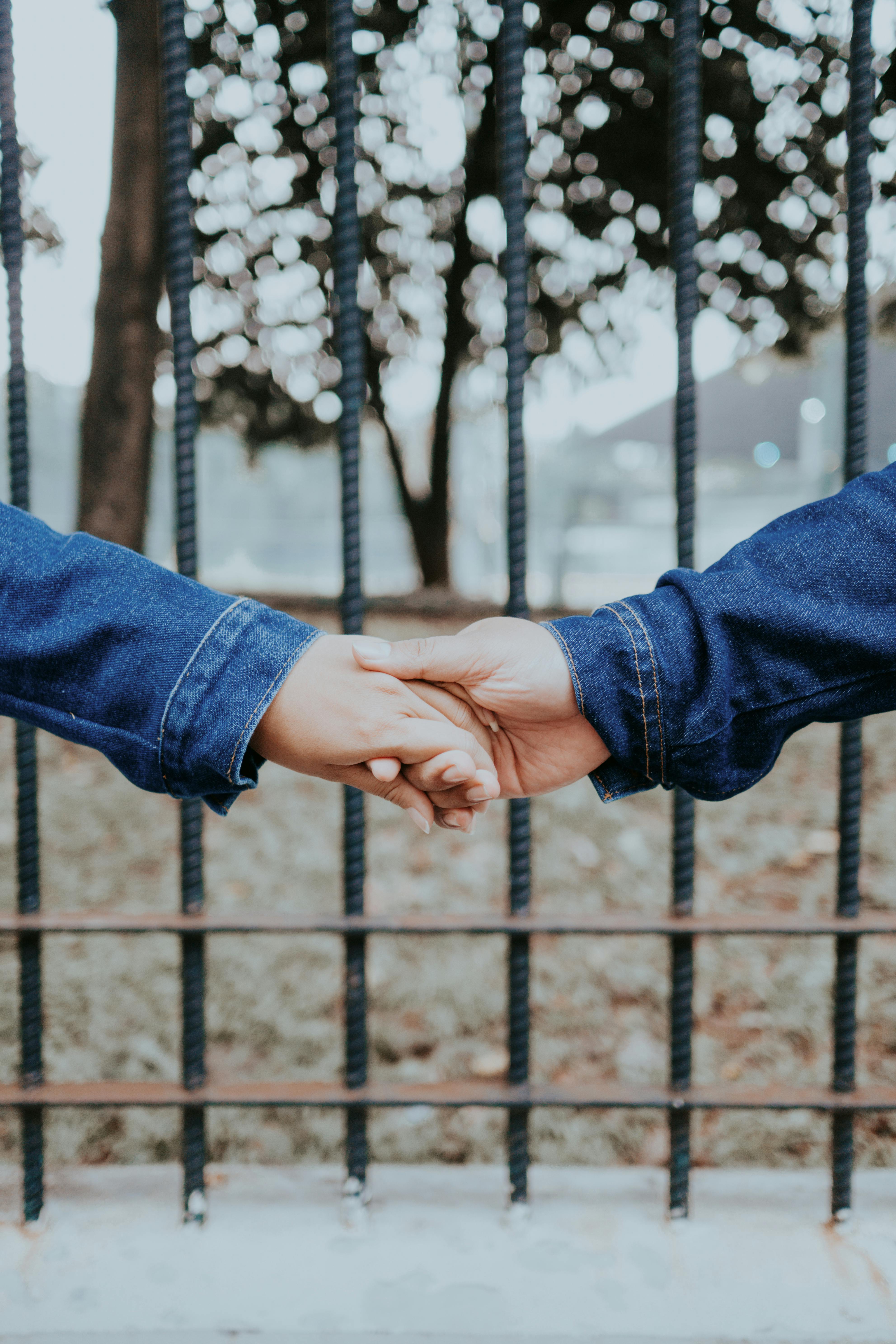 Person Holding the Railing · Free Stock Photo