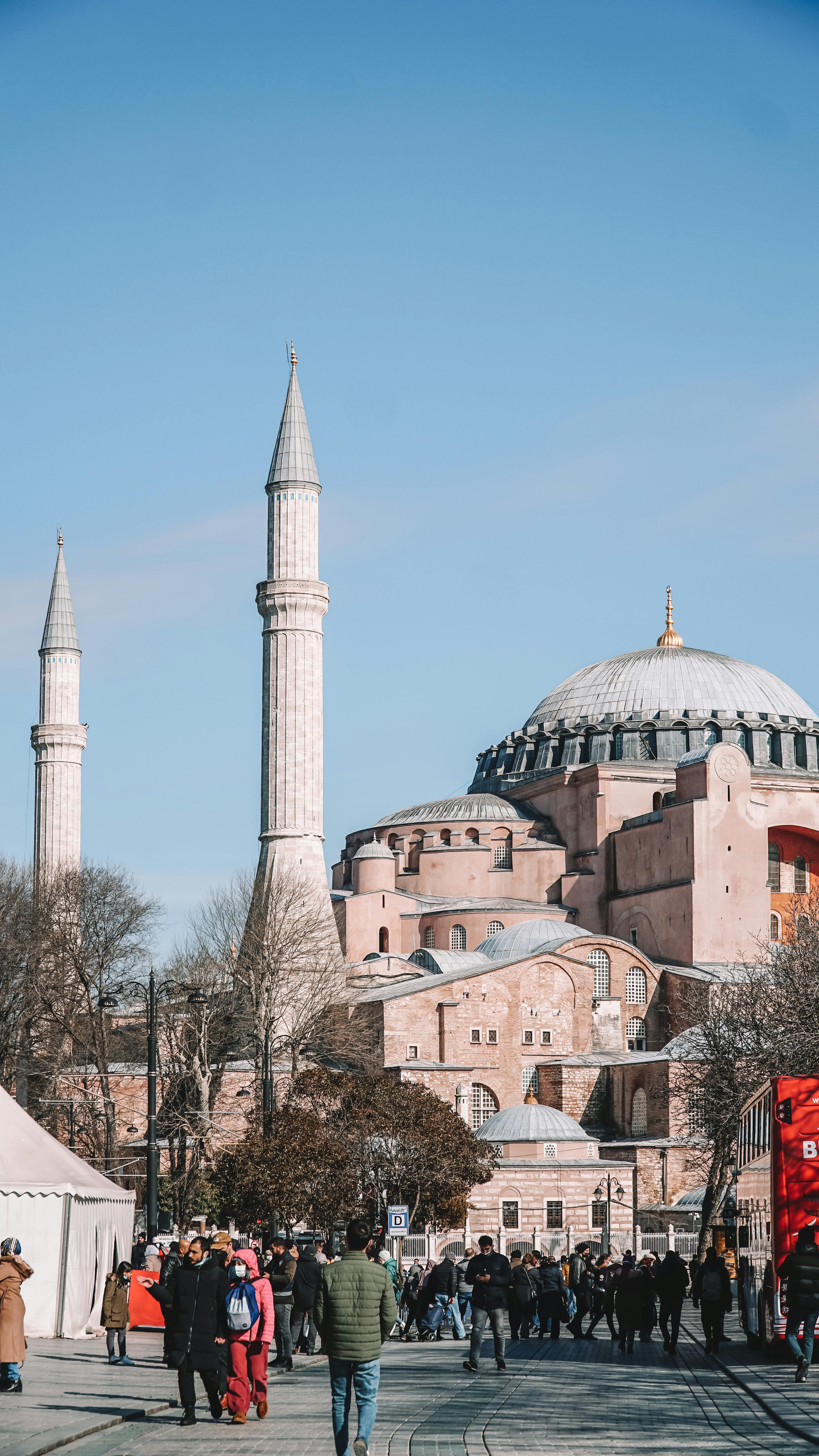 People on Street in Front of Mosque · Free Stock Photo