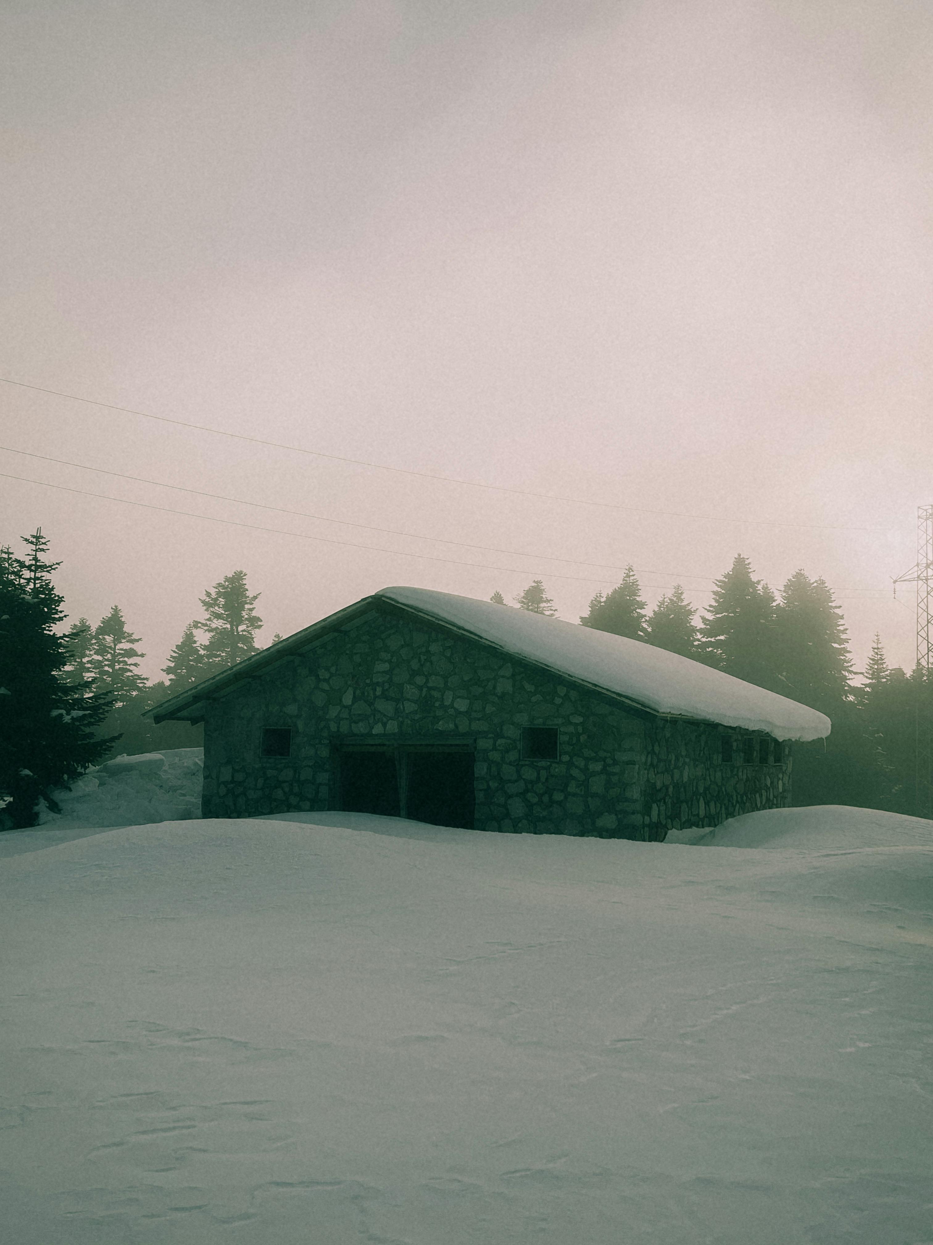 Snow Covered House on Mountain Area · Free Stock Photo