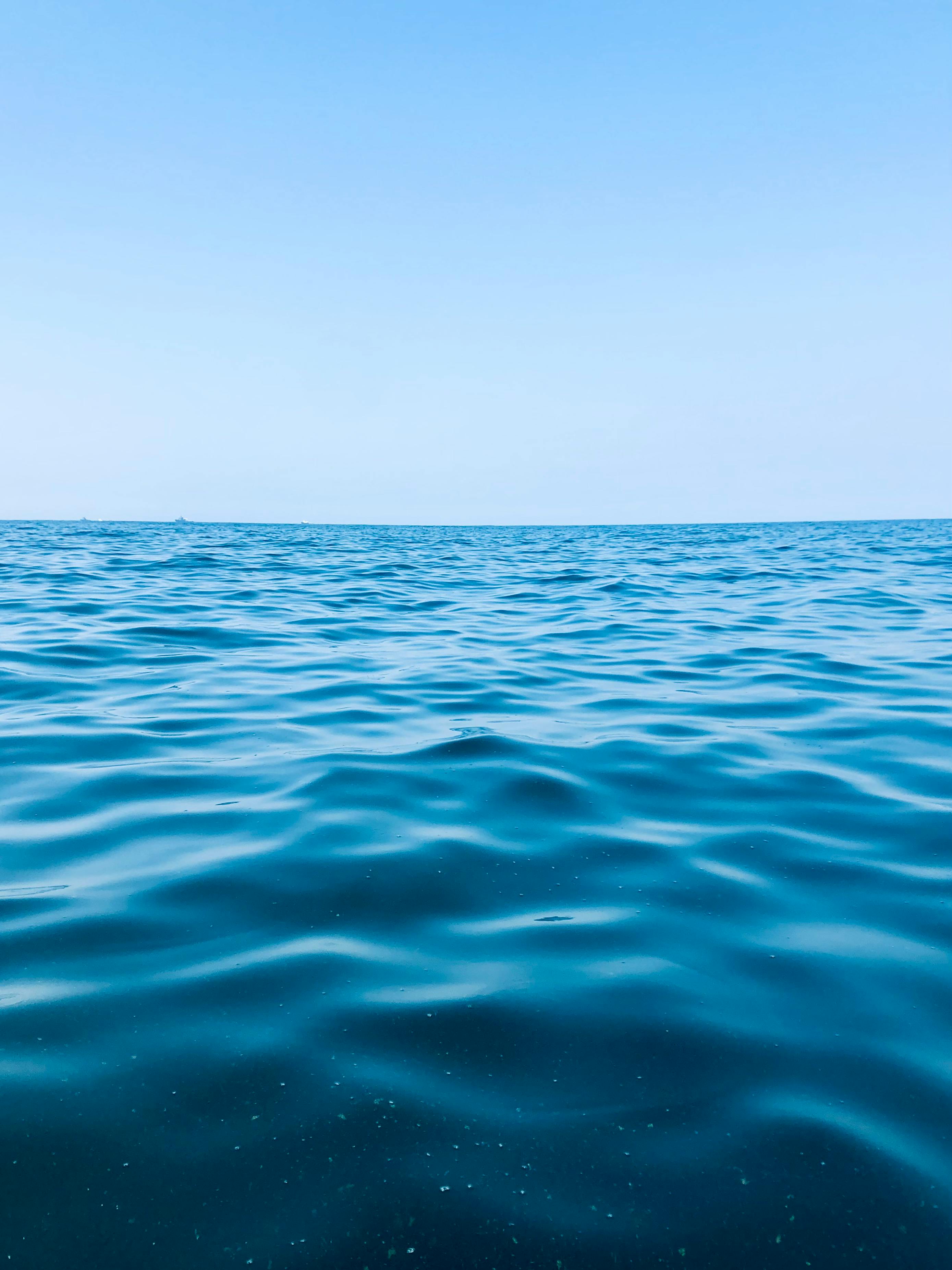 Blue Sea Under the Blue Sky · Free Stock Photo