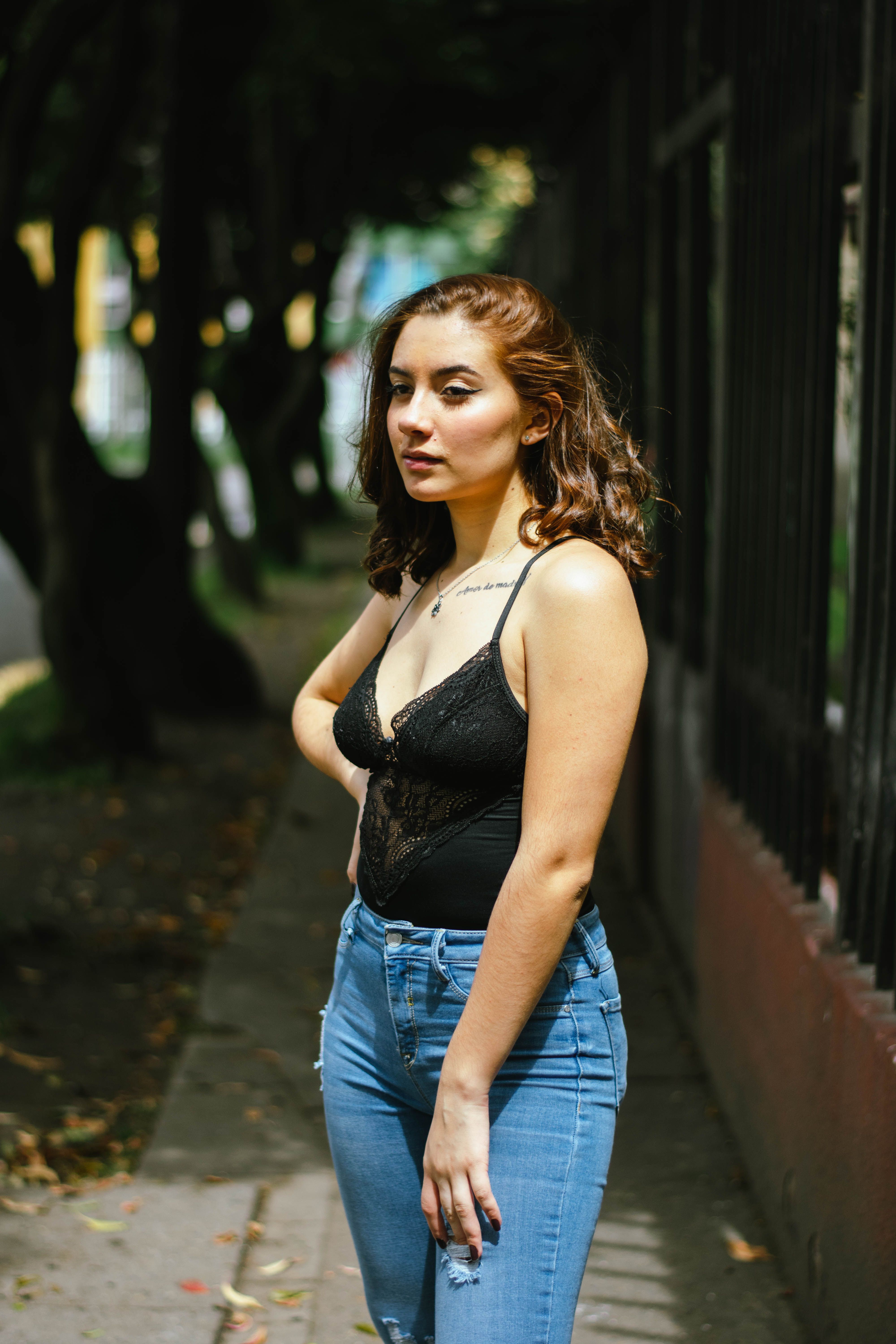 A Woman in Black Tank Top Posing · Free Stock Photo