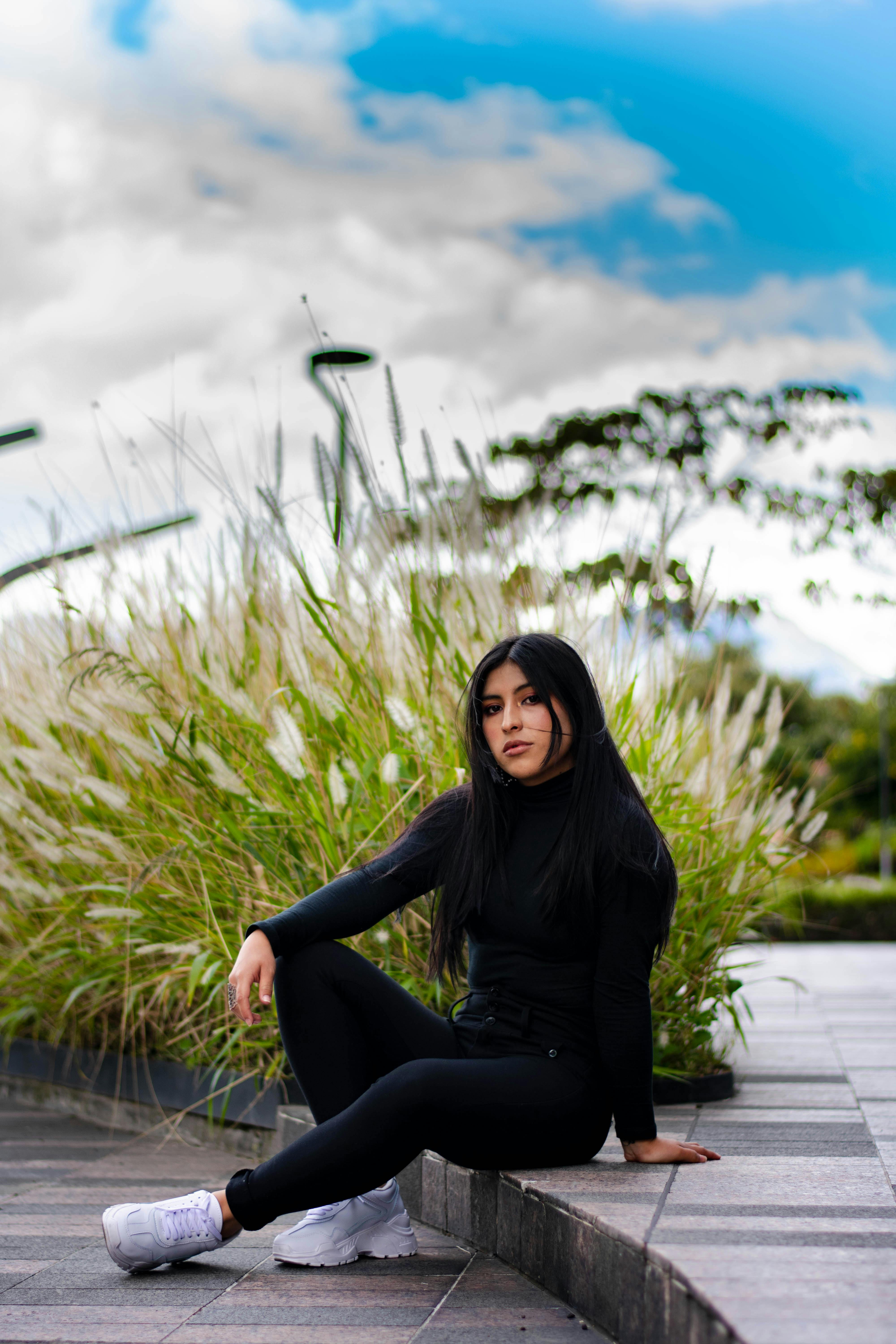 Woman Sitting on Step · Free Stock Photo