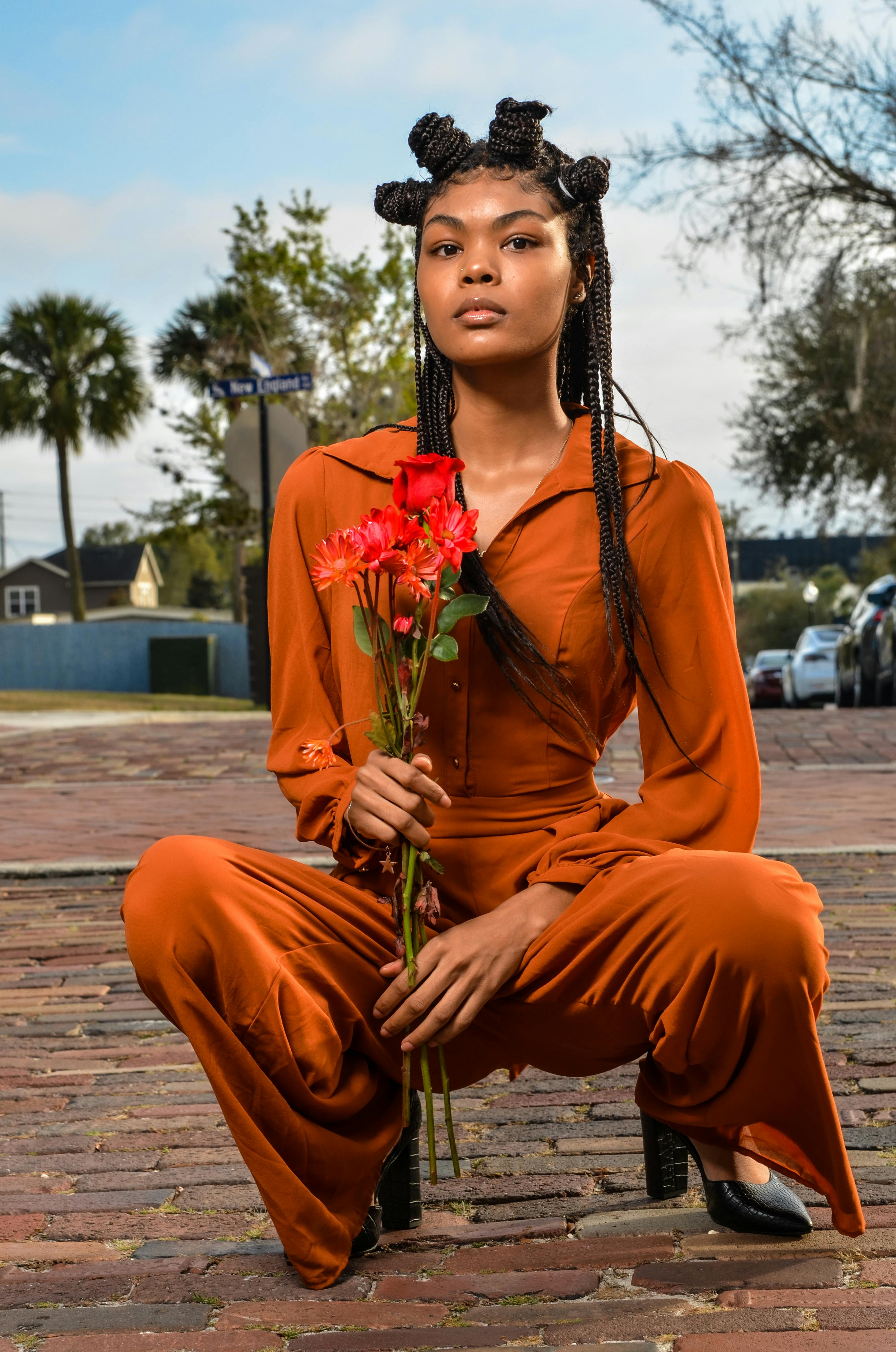 Woman in Orange Clothing · Free Stock Photo