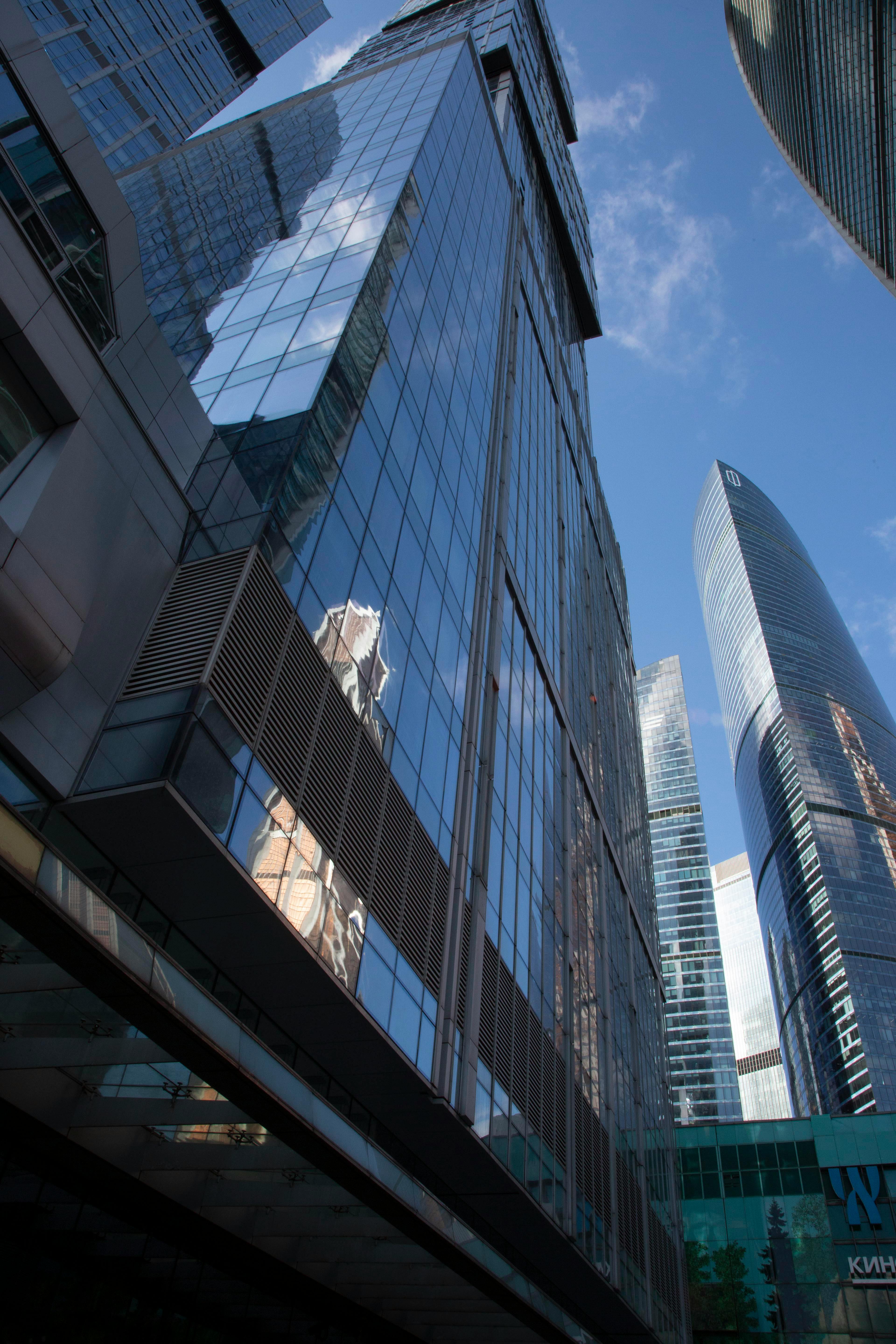 High-Rise Building with Glass Wall · Free Stock Photo