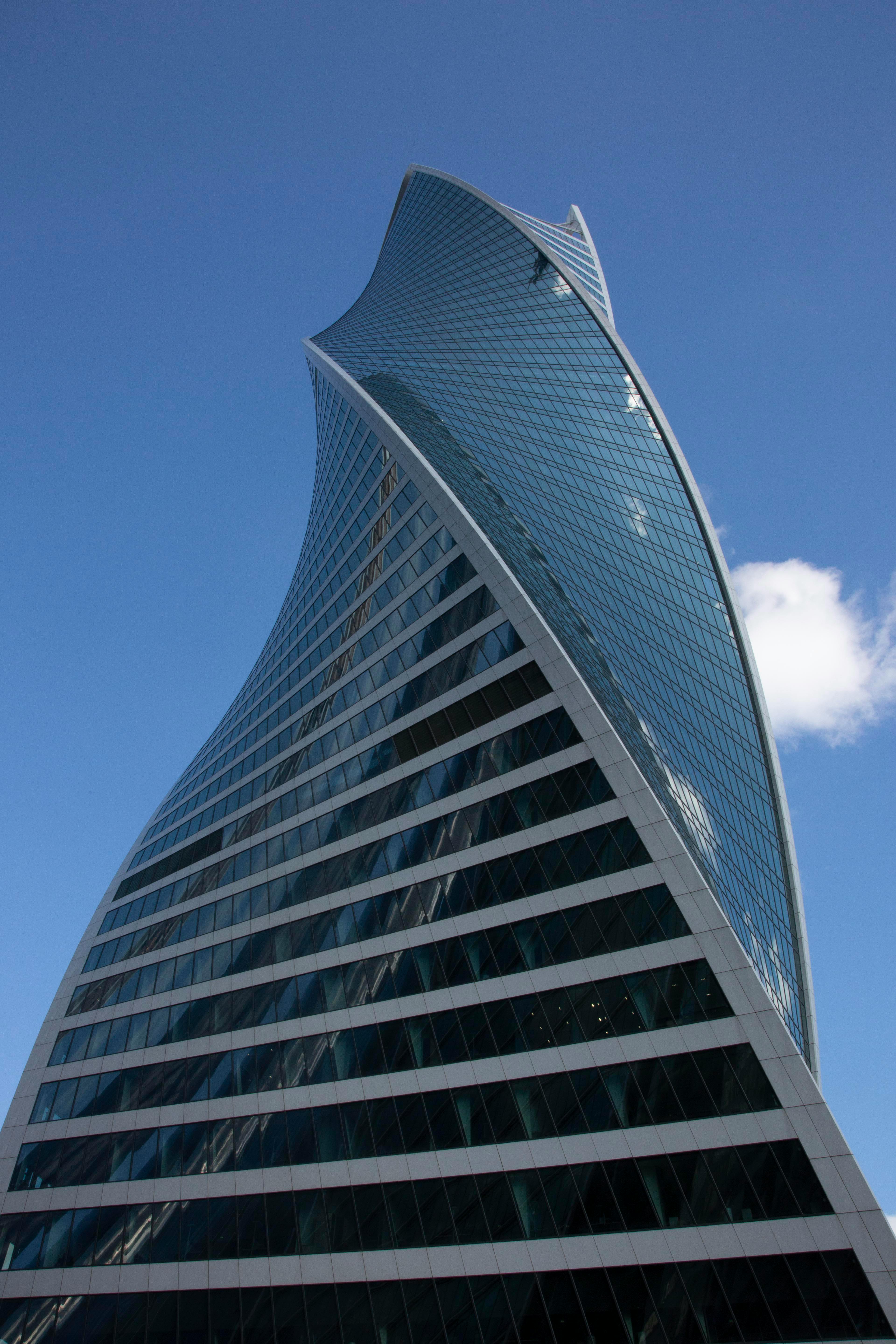 Modern Tall City Building on Blue Sky · Free Stock Photo