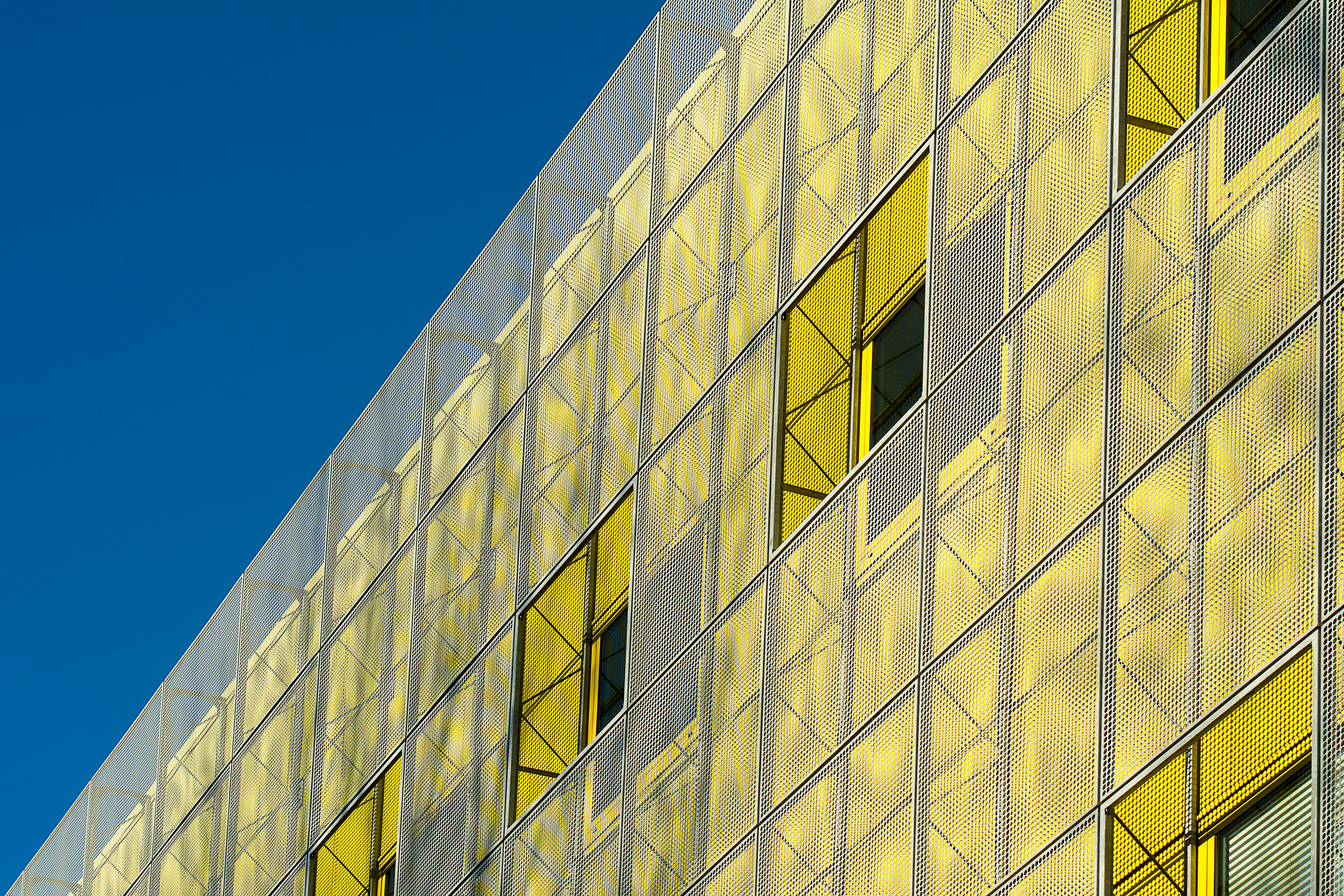 Modern Yellow Building against Blue Sky · Free Stock Photo