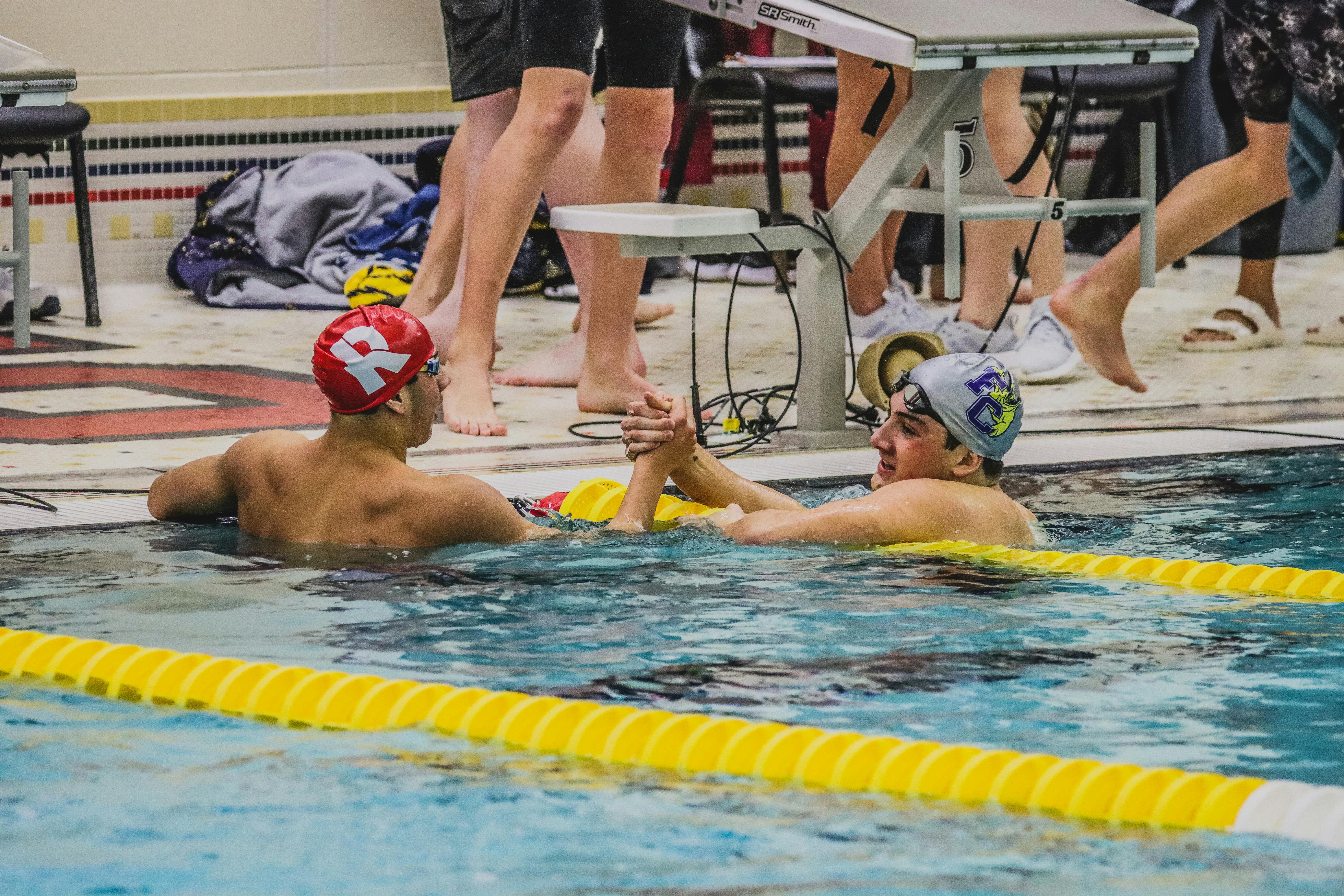 Swimmers Shaking Hands after Competition · Free Stock Photo