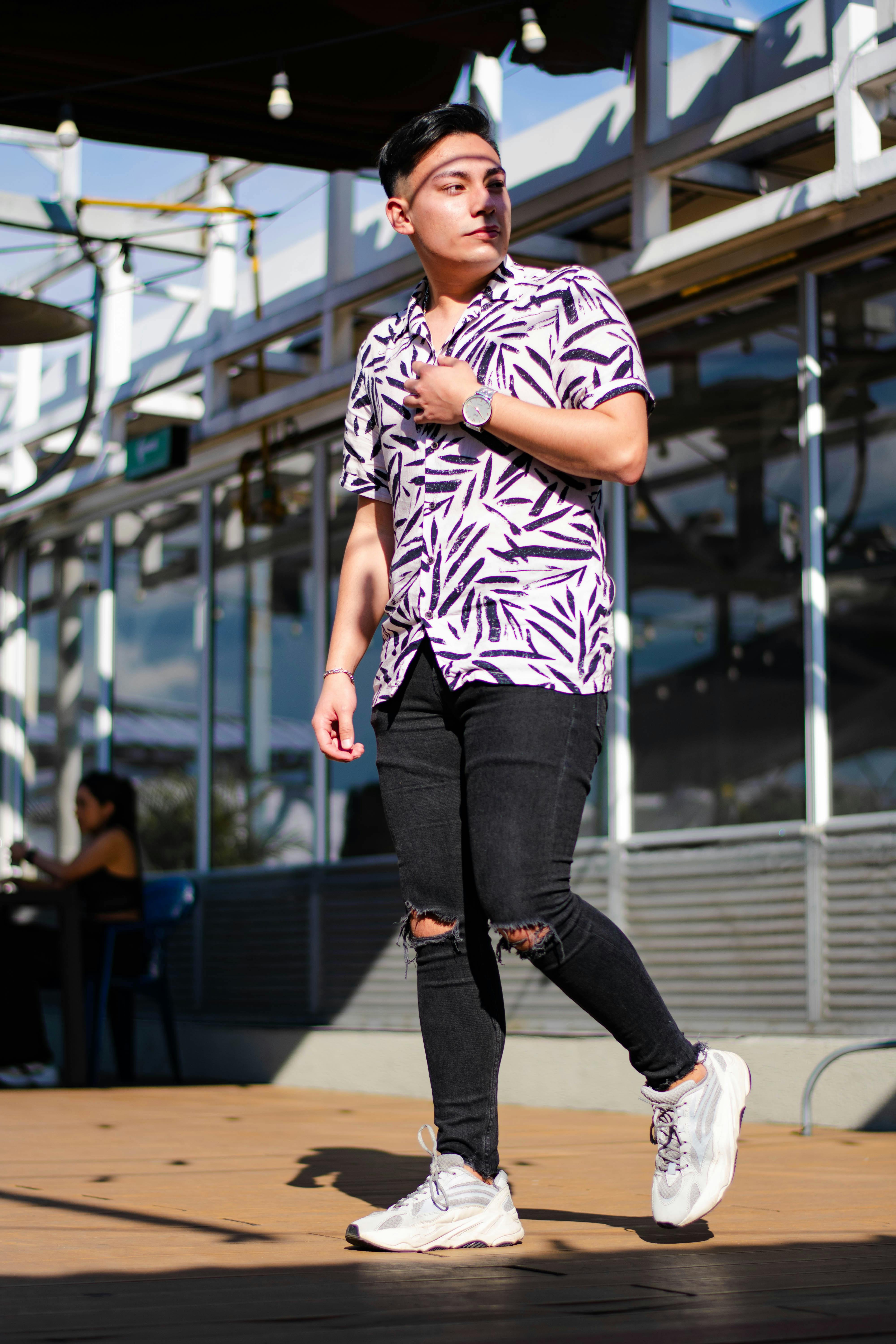 Man in Ripped Jeans · Free Stock Photo