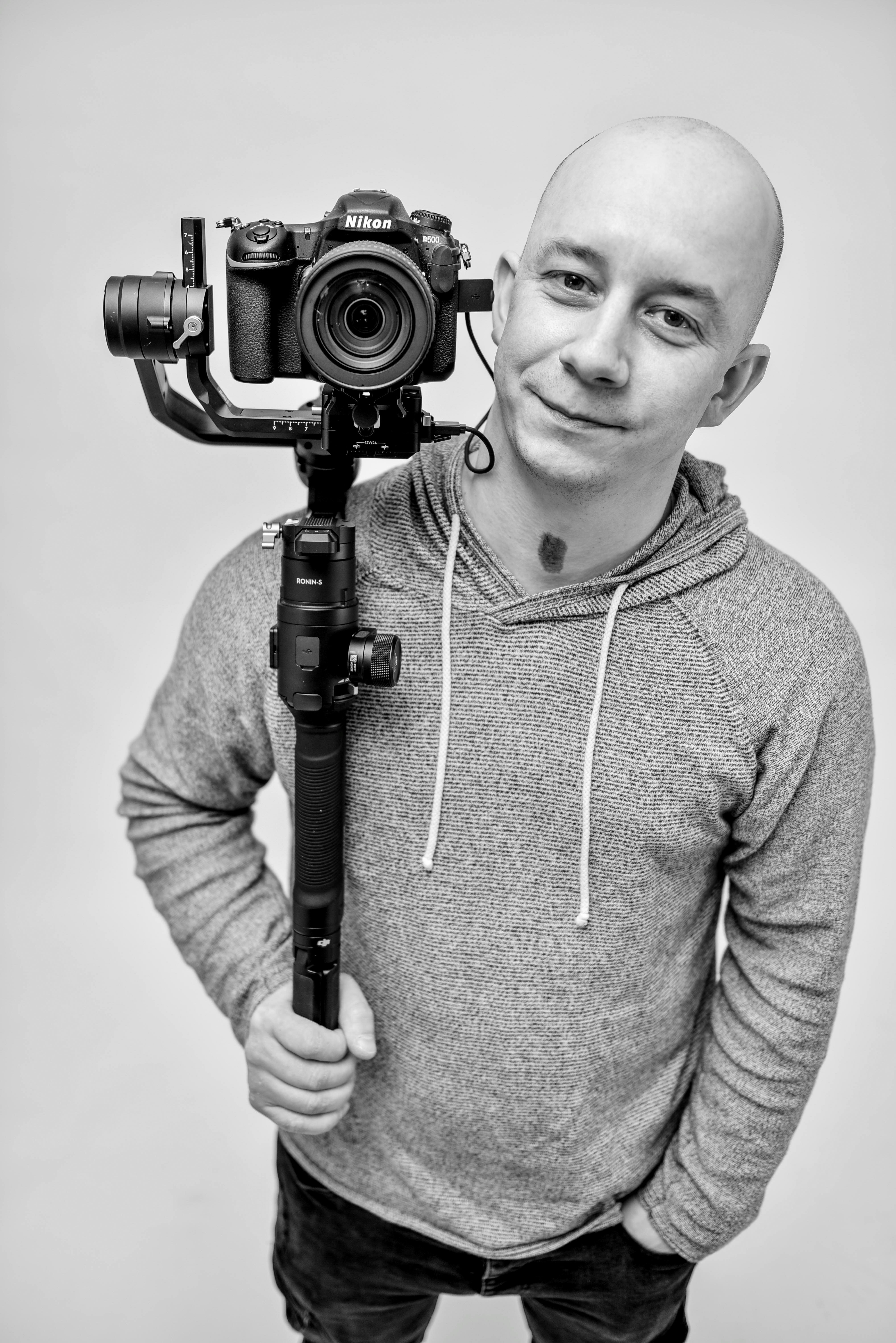 Man Holding a Gimbal · Free Stock Photo