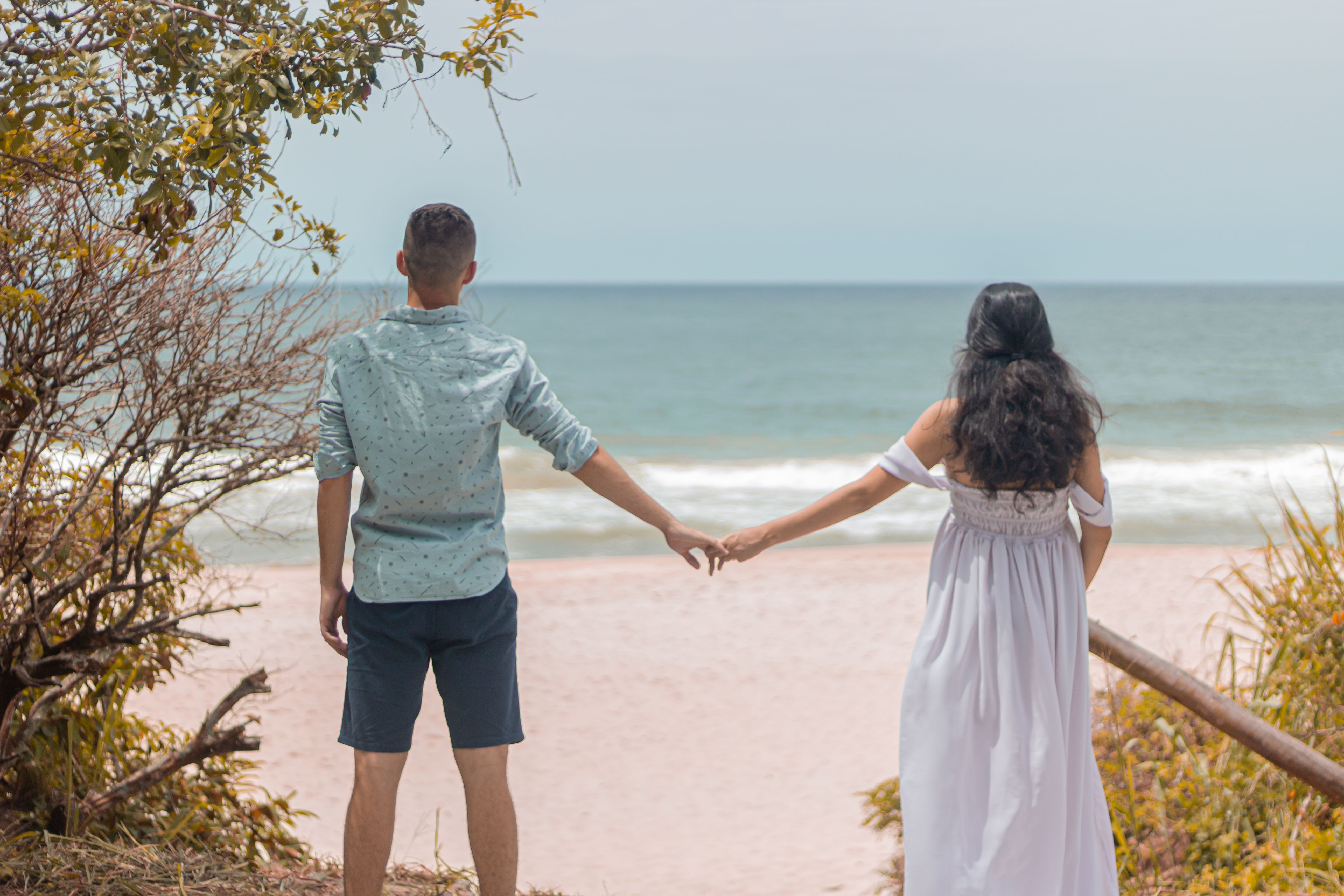 Back View of a Couple Doing Holding hands · Free Stock Photo