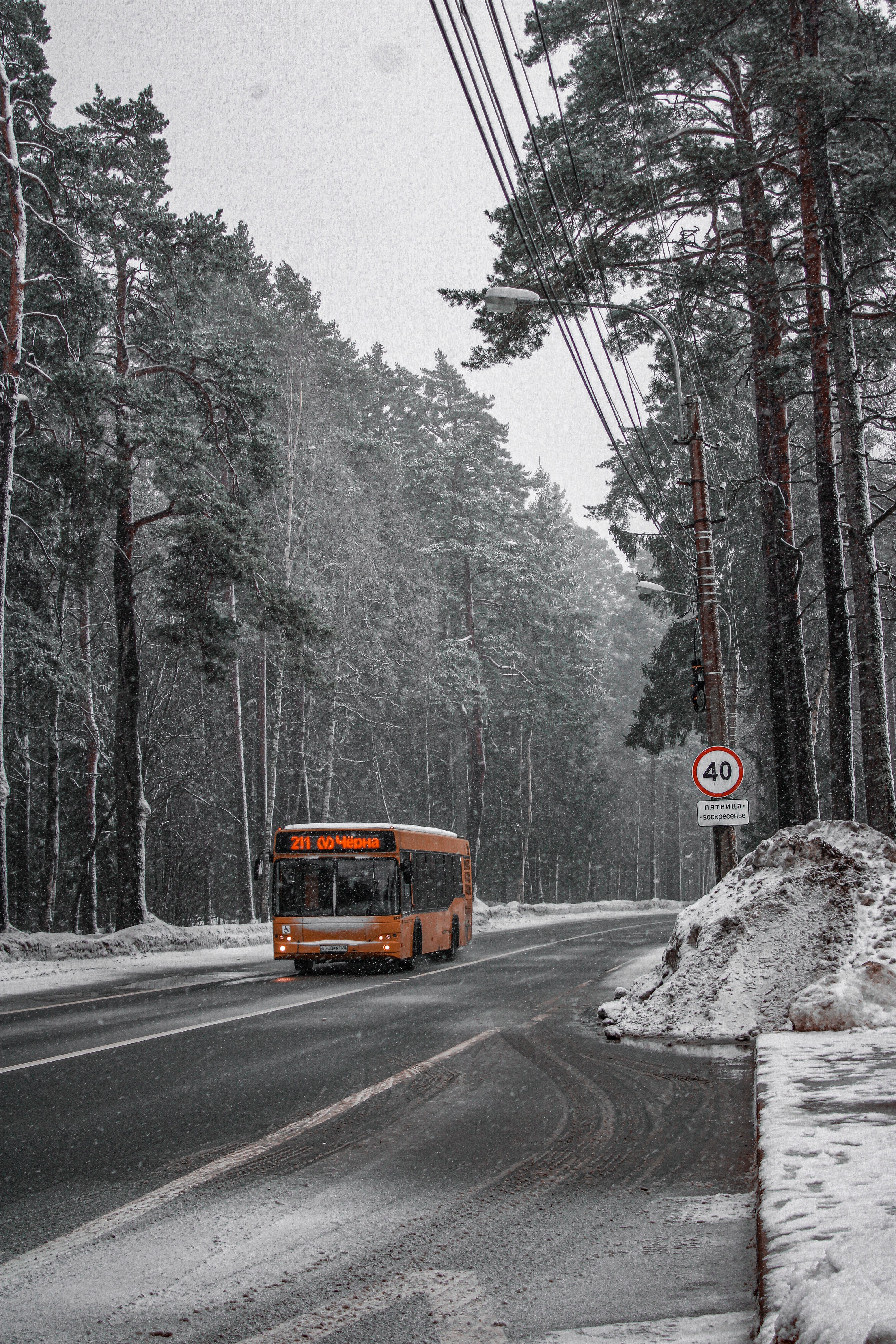 Yellow Bus on Road Covered With Snow · Free Stock Photo