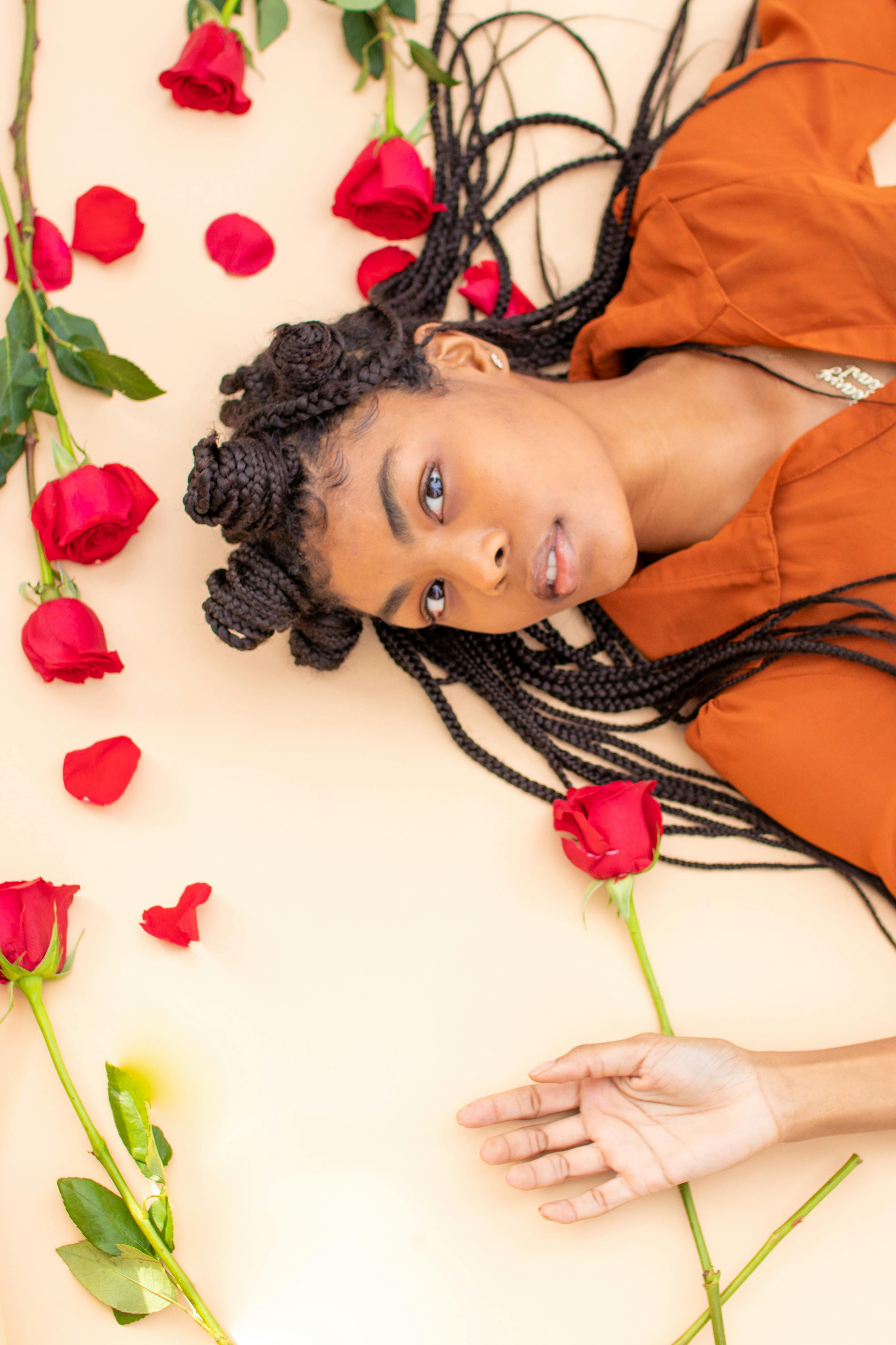 Photo of a Woman's Hair with Roses · Free Stock Photo