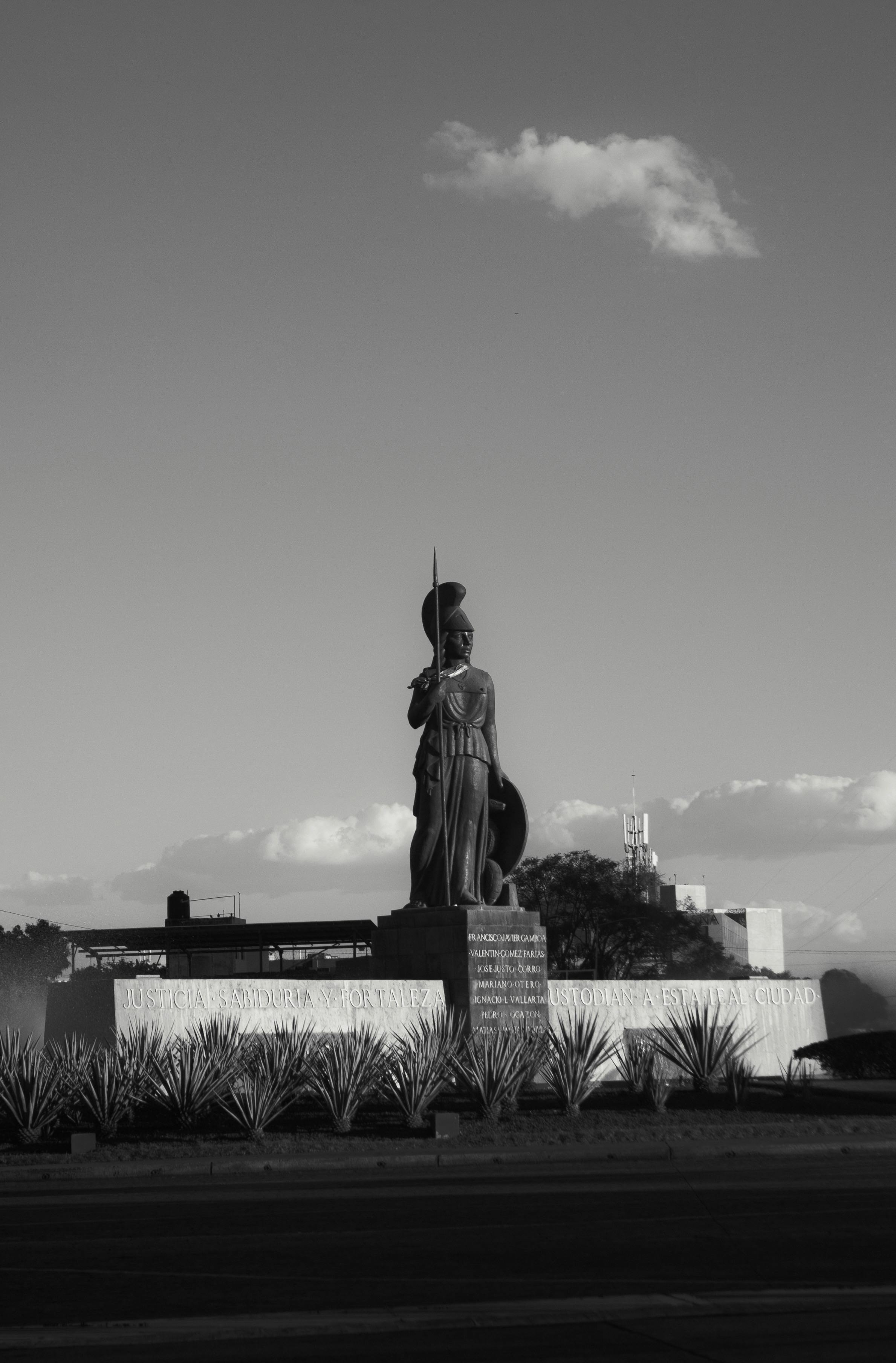 Grayscale Photo of a Statue · Free Stock Photo