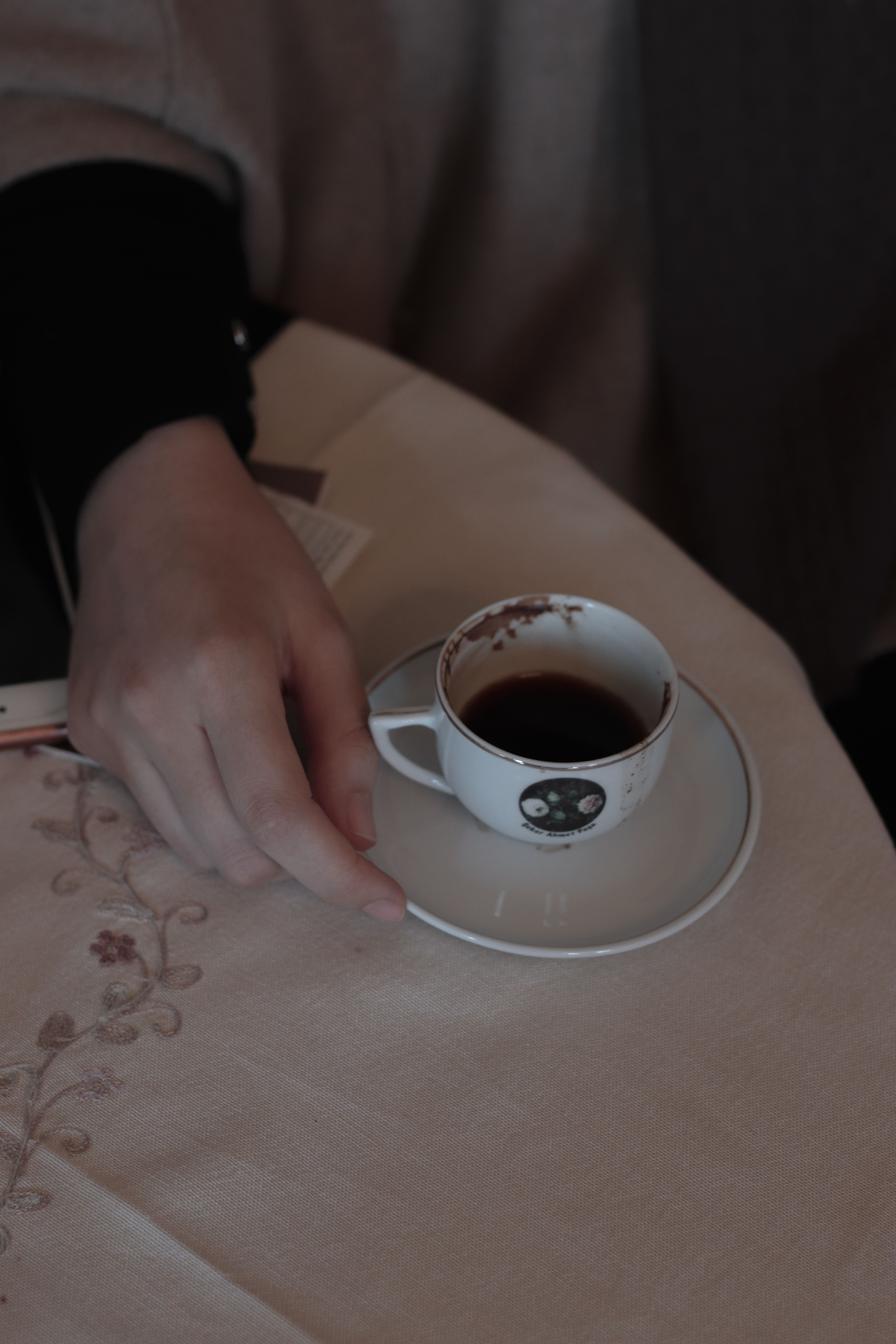 Person Looking Down at Hands on Table · Free Stock Photo