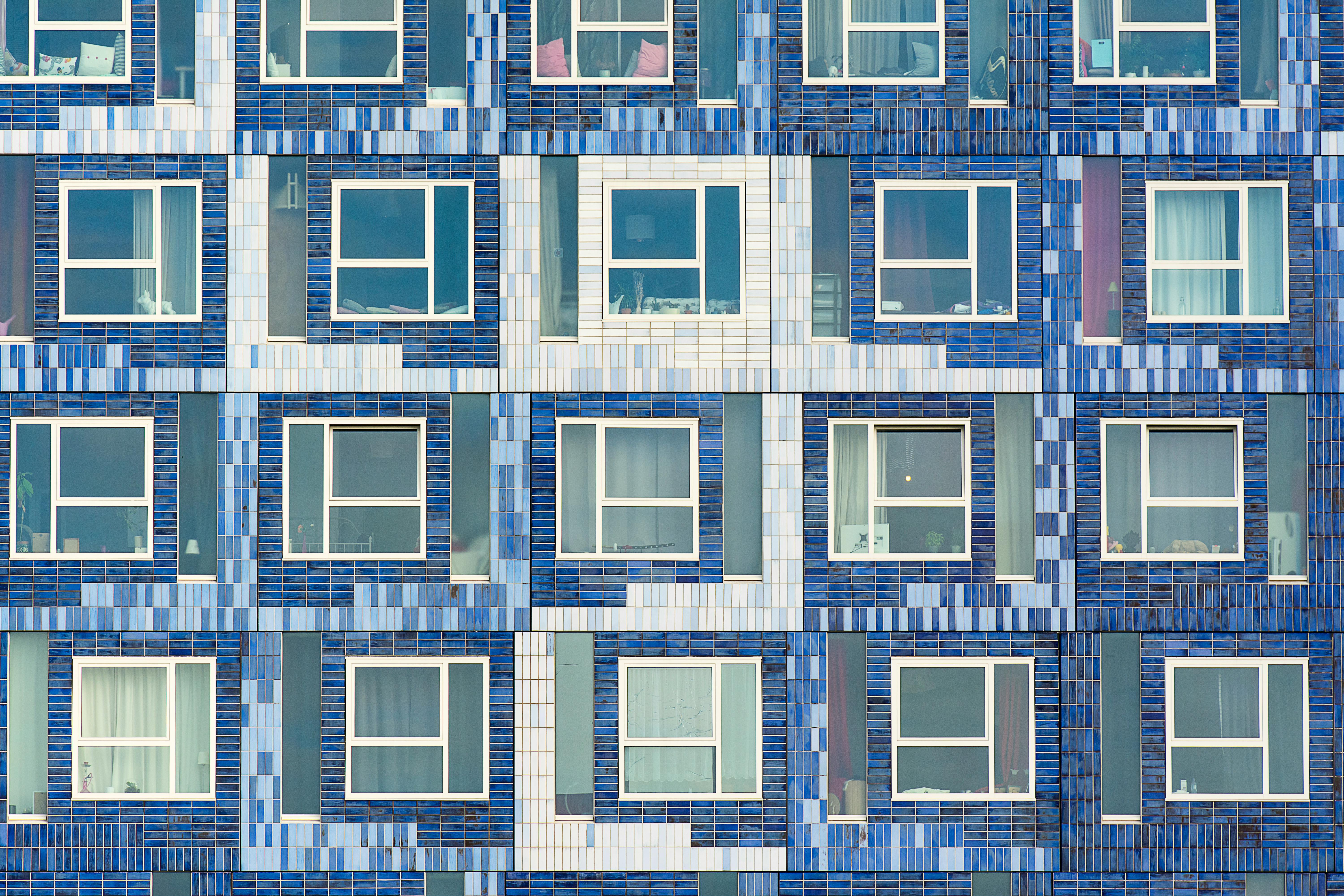 Blue and White Glass Windows of a Building · Free Stock Photo