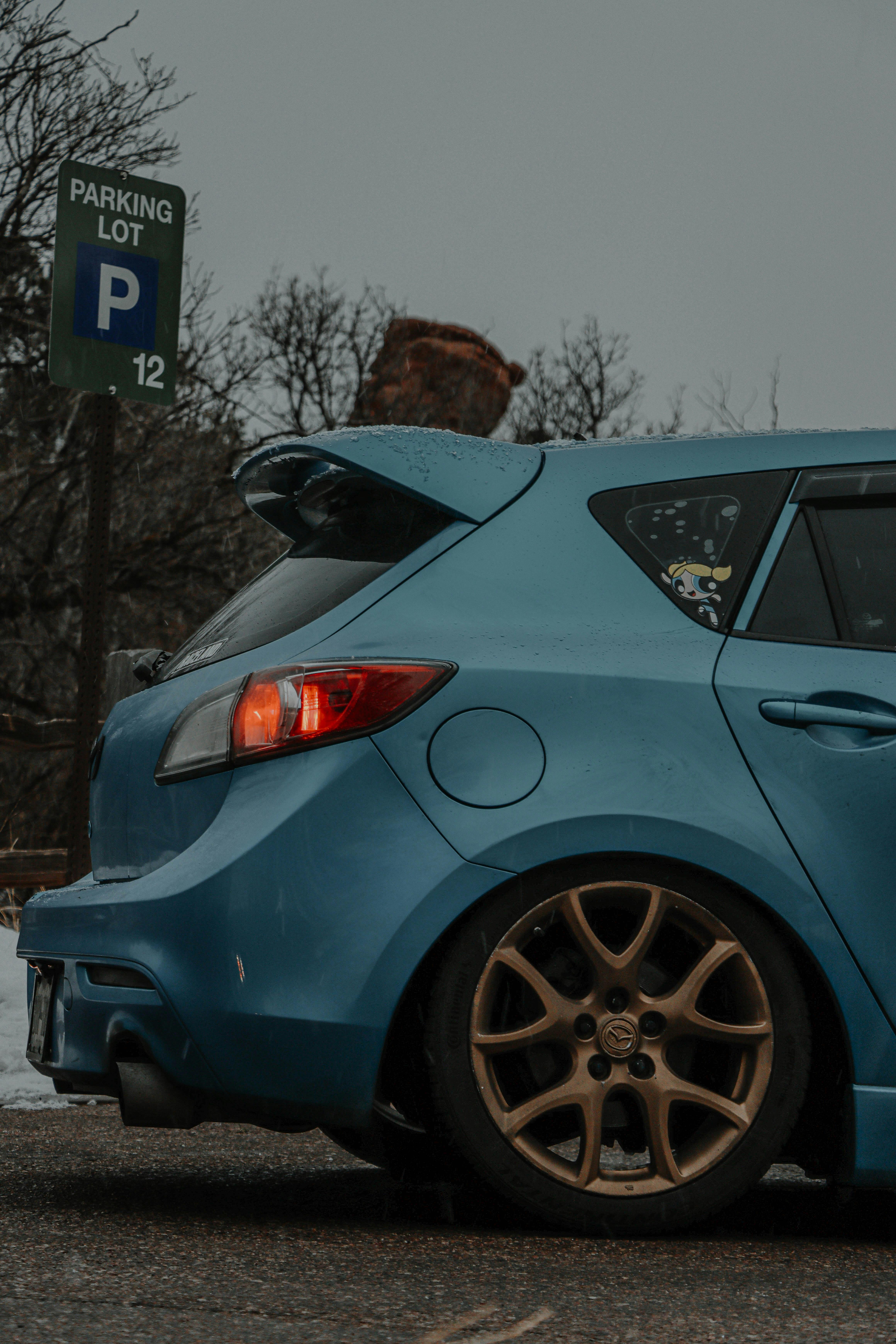 A Blue Car on Road · Free Stock Photo
