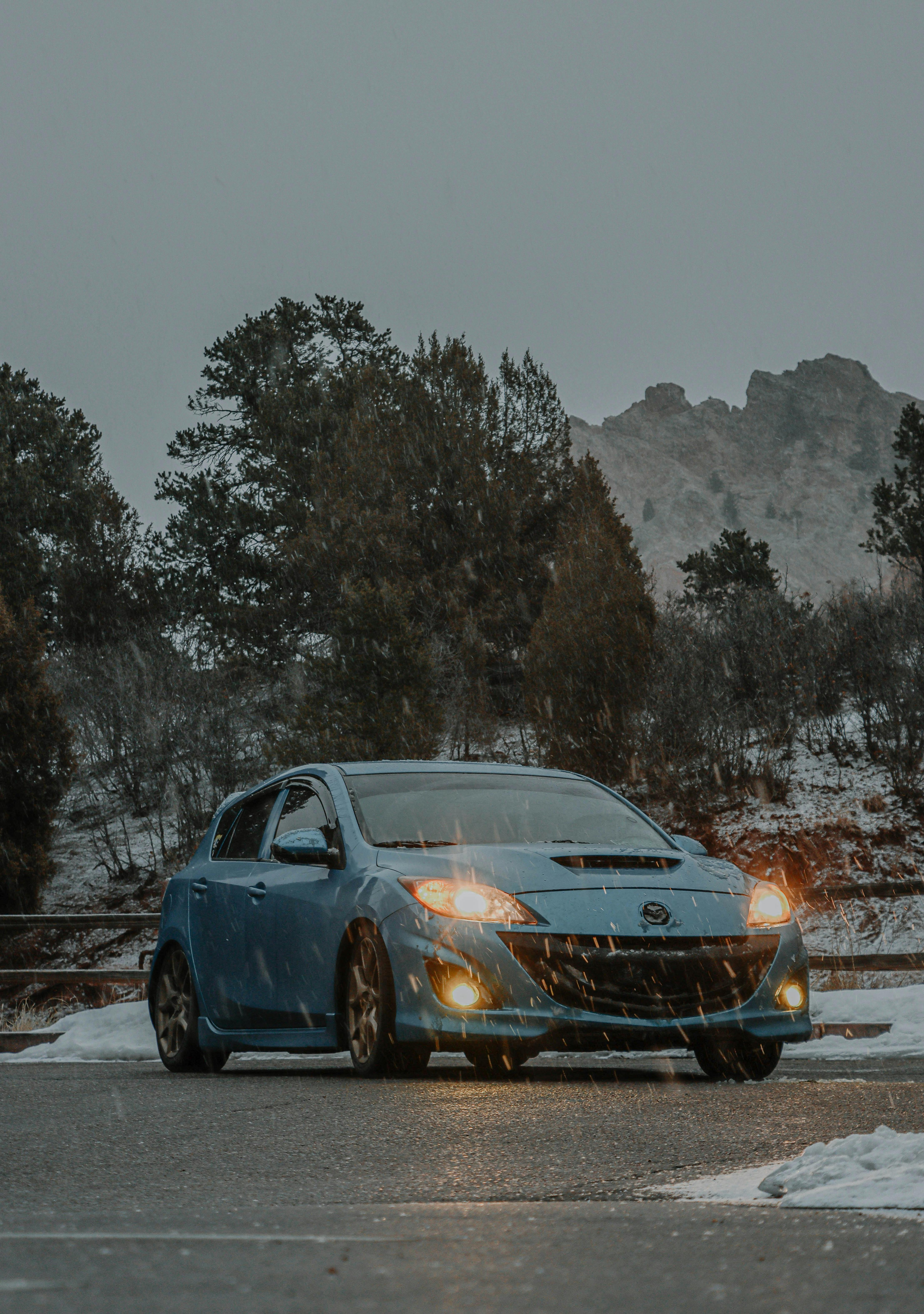 Blue Car on the Road · Free Stock Photo