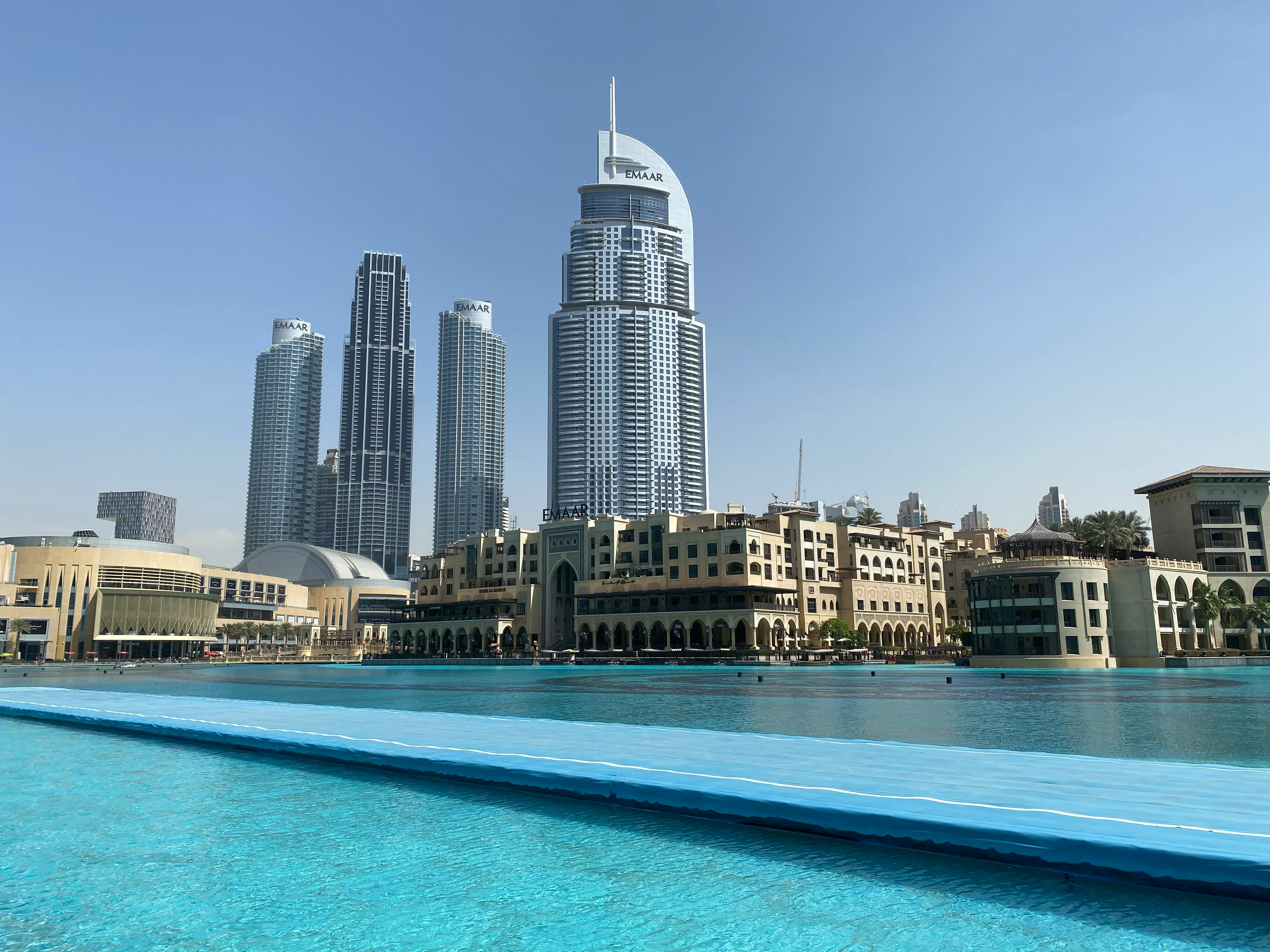 Swimming Pool with Dubai Skyscrapers behind · Free Stock Photo