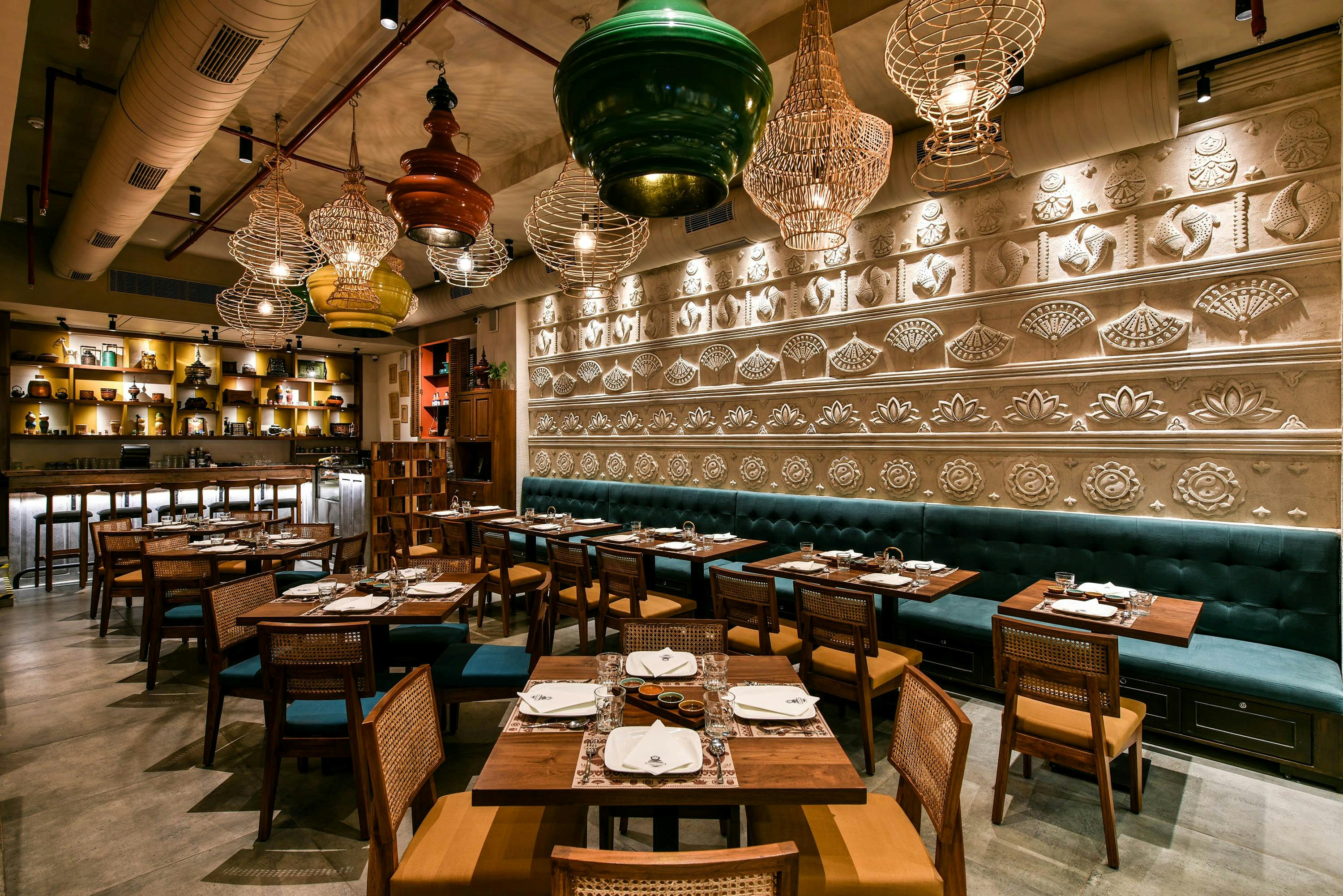 Lights over Tables and Chairs in Restaurant · Free Stock Photo