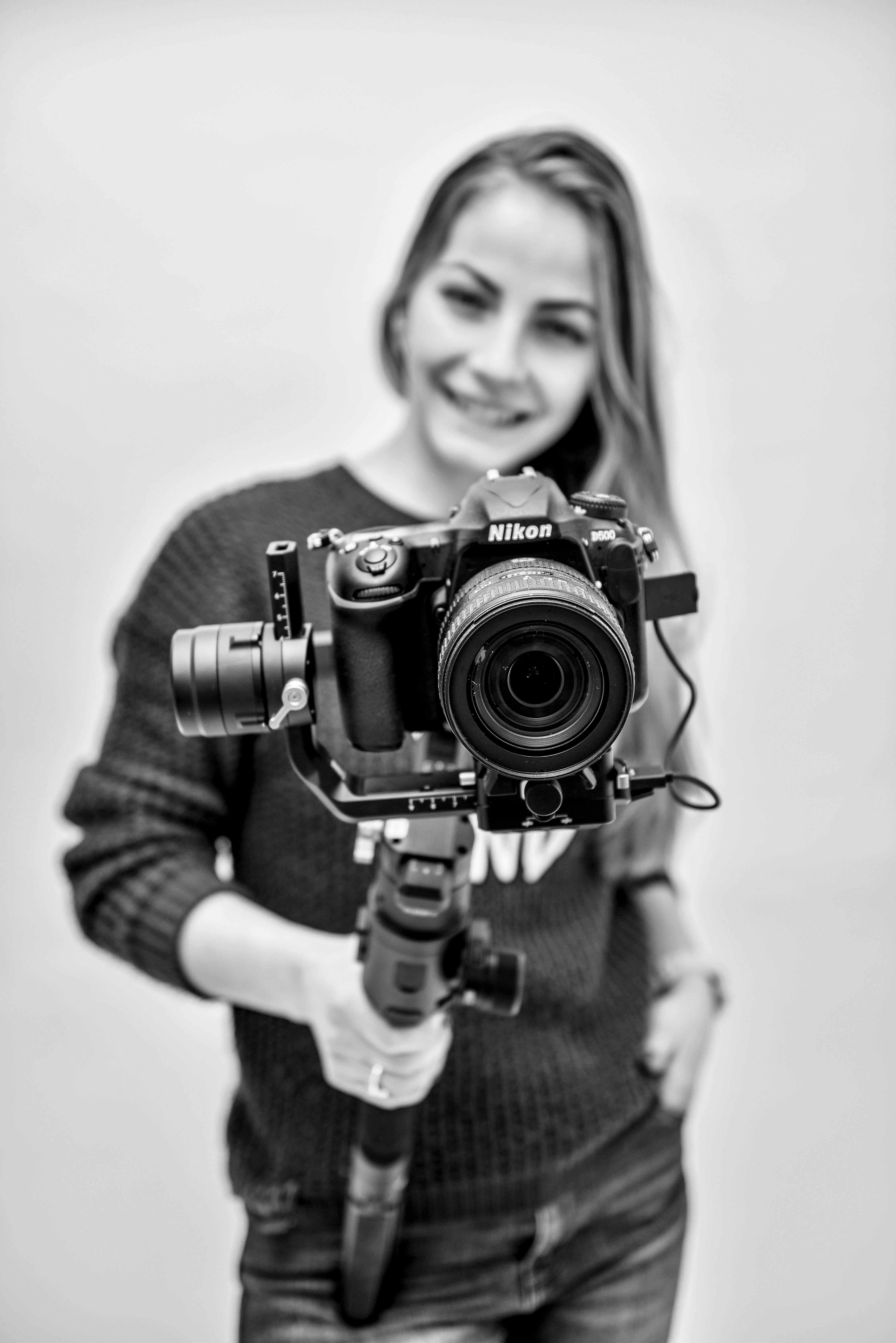 Portrait of Woman with Camera · Free Stock Photo
