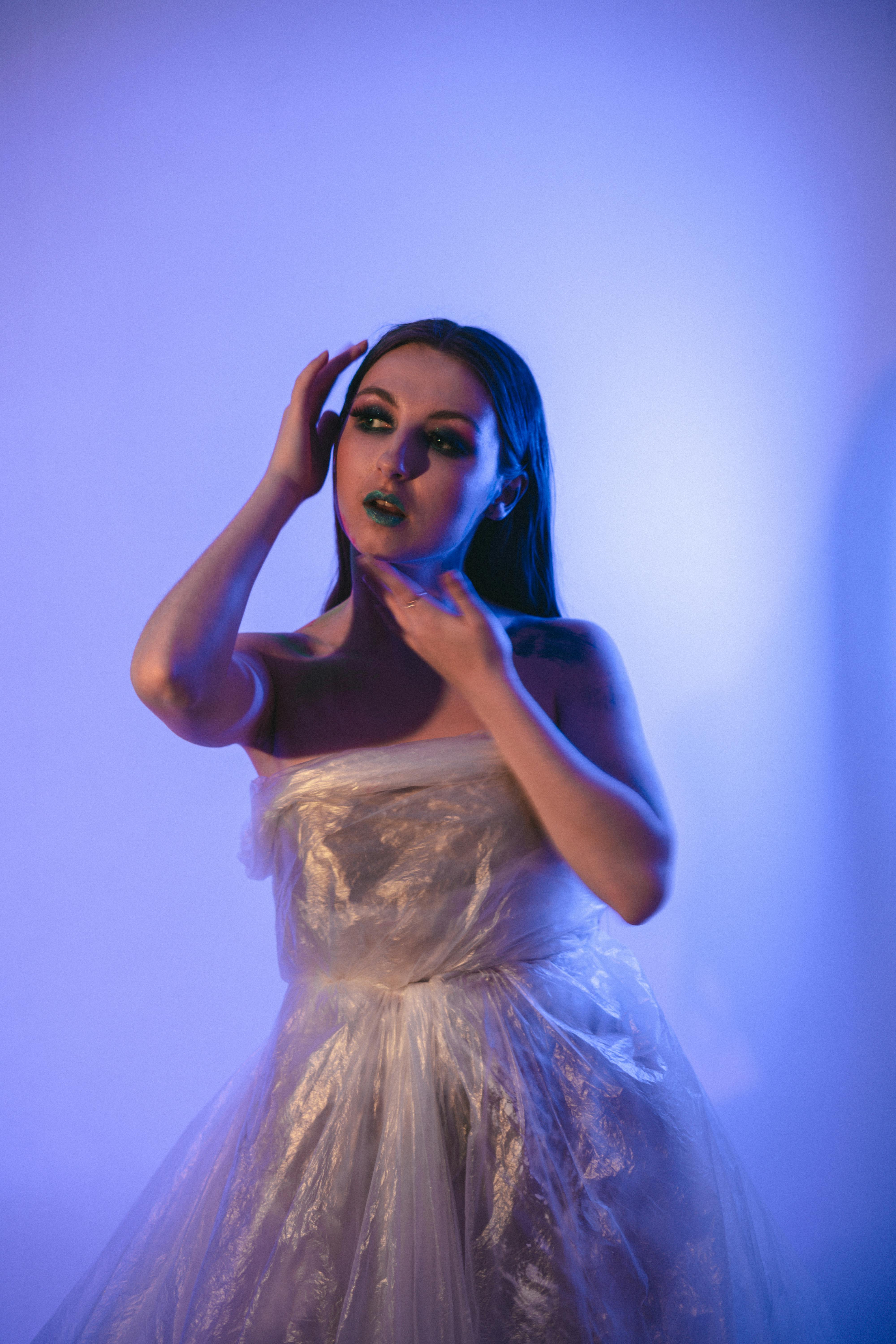 A Woman in a Plastic Dress · Free Stock Photo