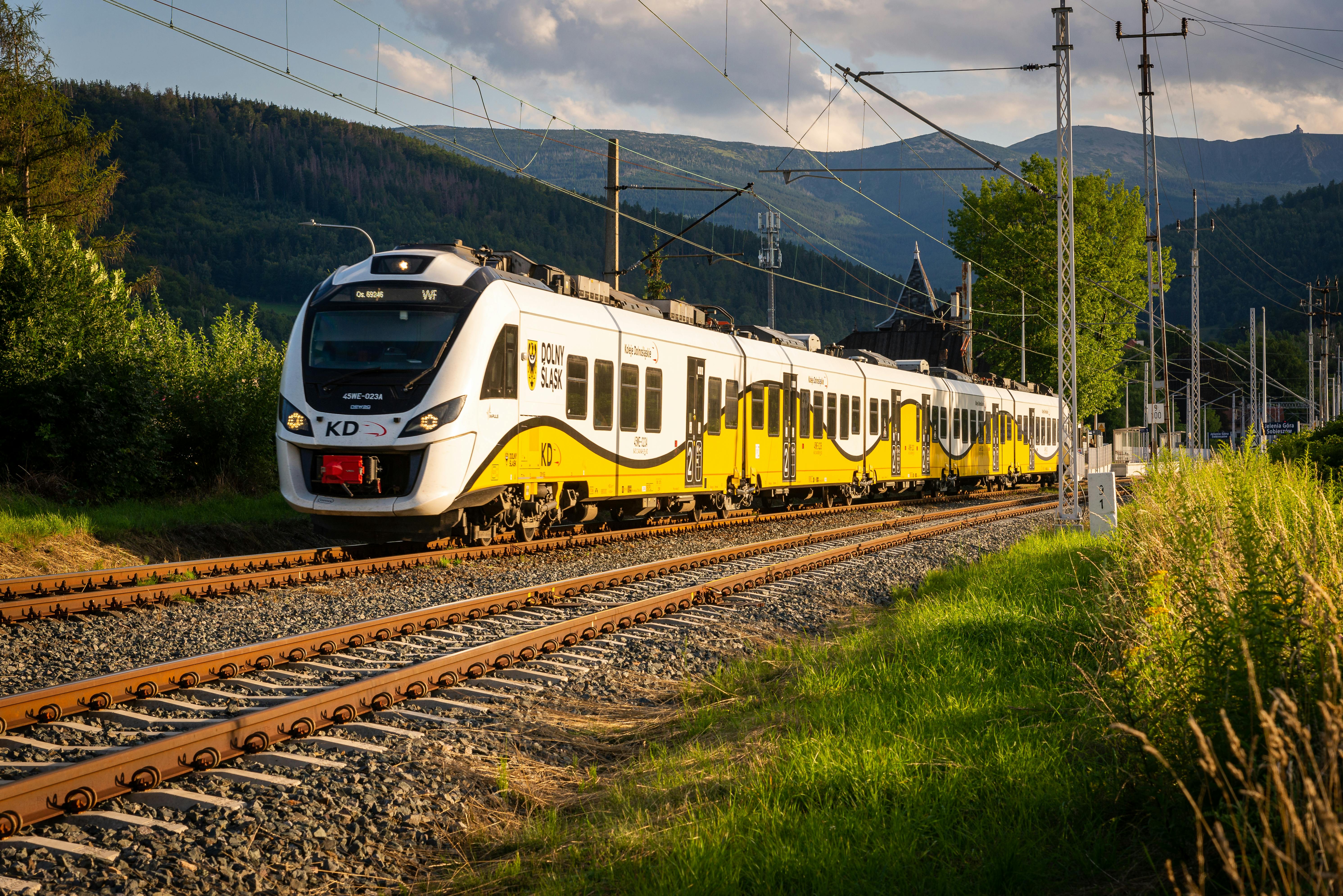 White and Yellow Train on the Railway · Free Stock Photo