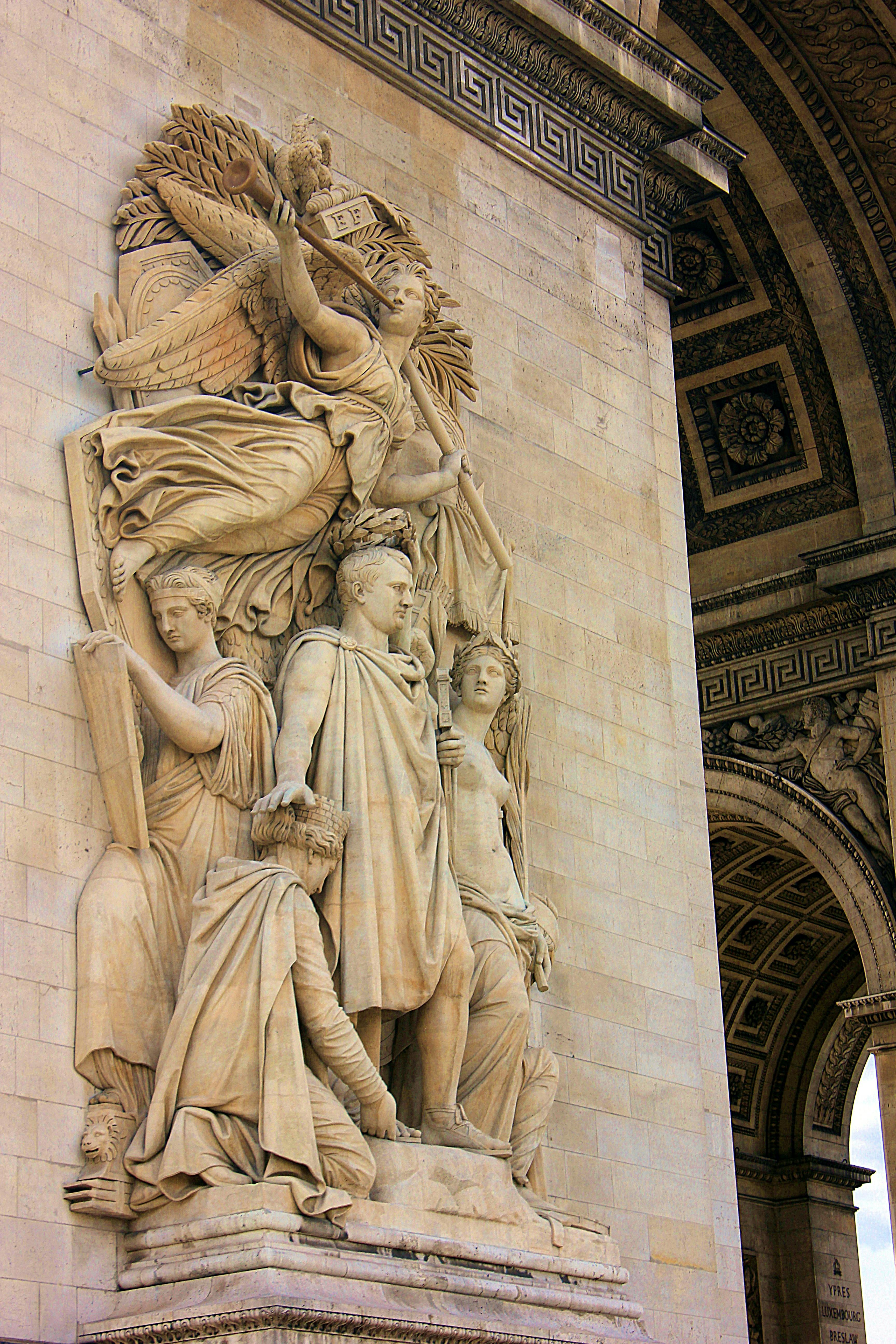 Brown Concrete Statues · Free Stock Photo