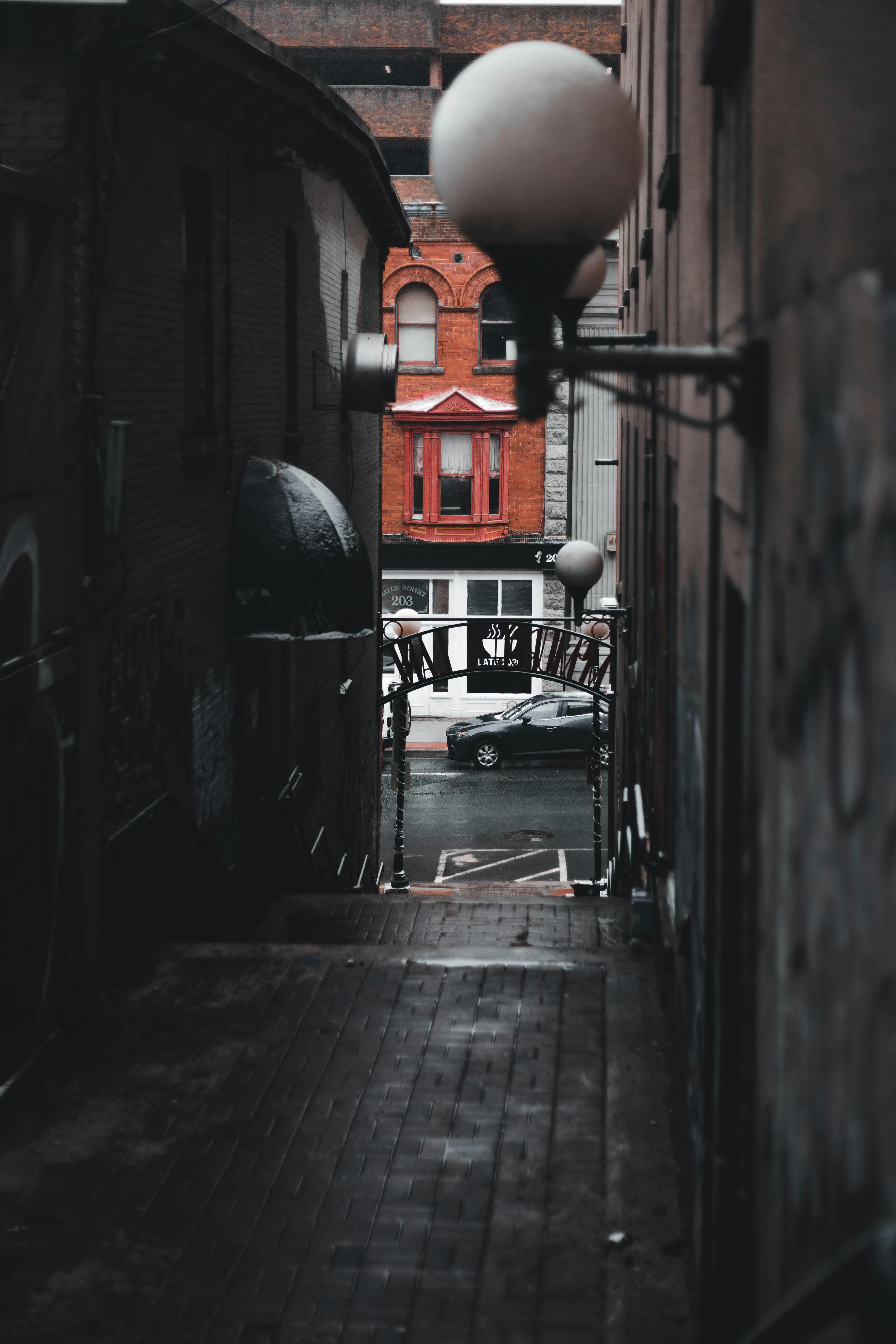 Photograph of an Alley with Lights · Free Stock Photo