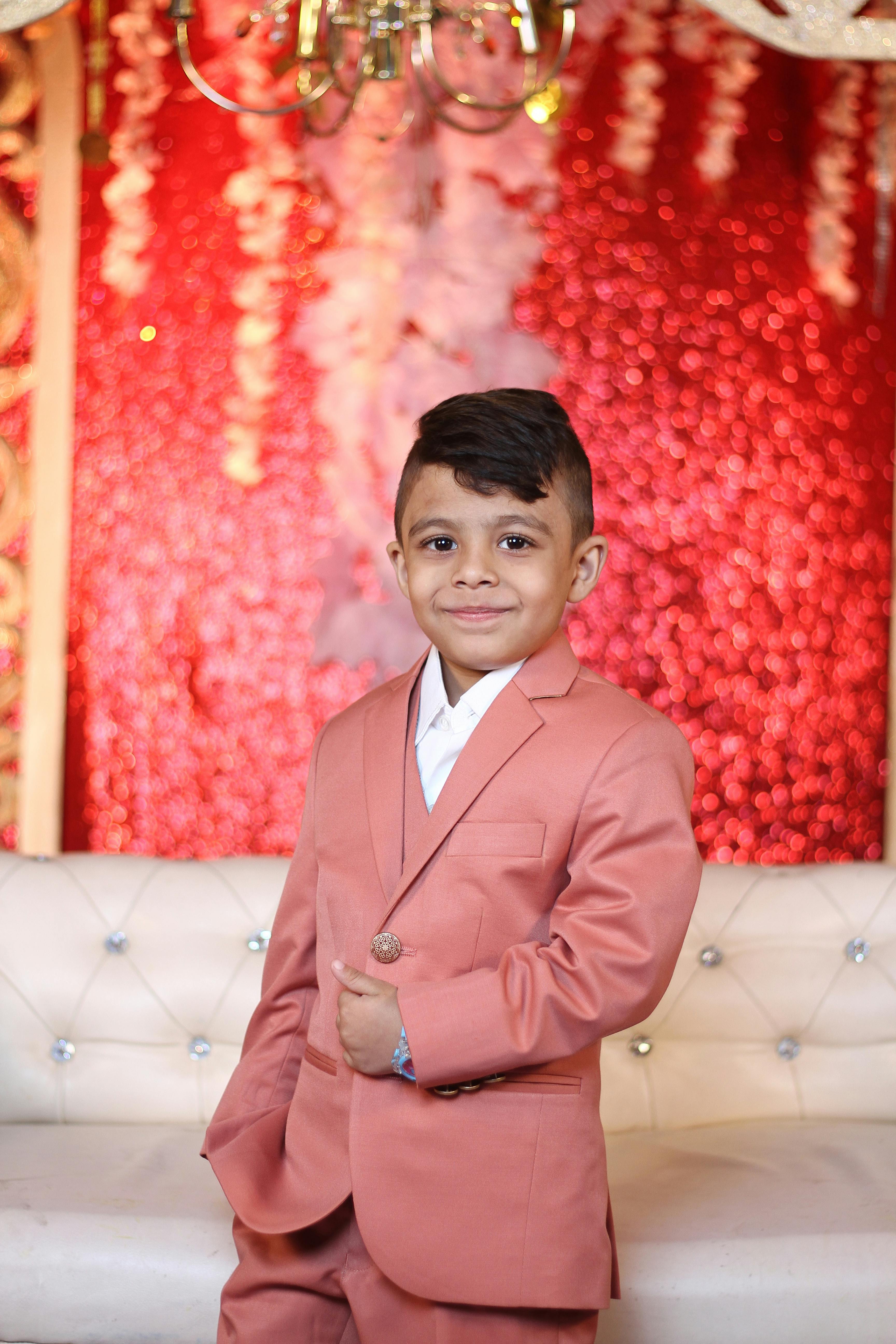 The Groom in a Suit and Sunglasses Posing Outdoors and Smiling · Free ...