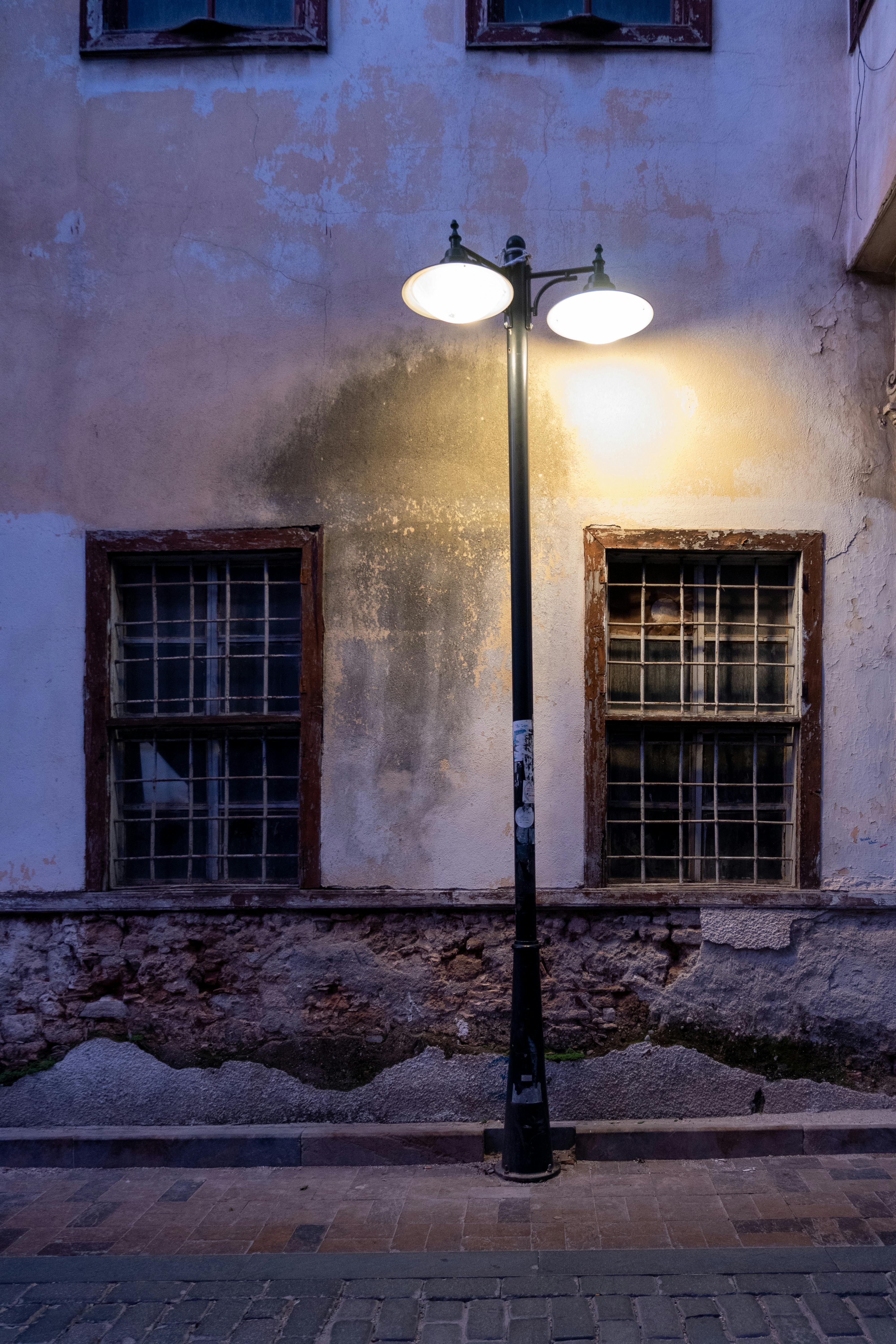 A Street Light Near Windows · Free Stock Photo