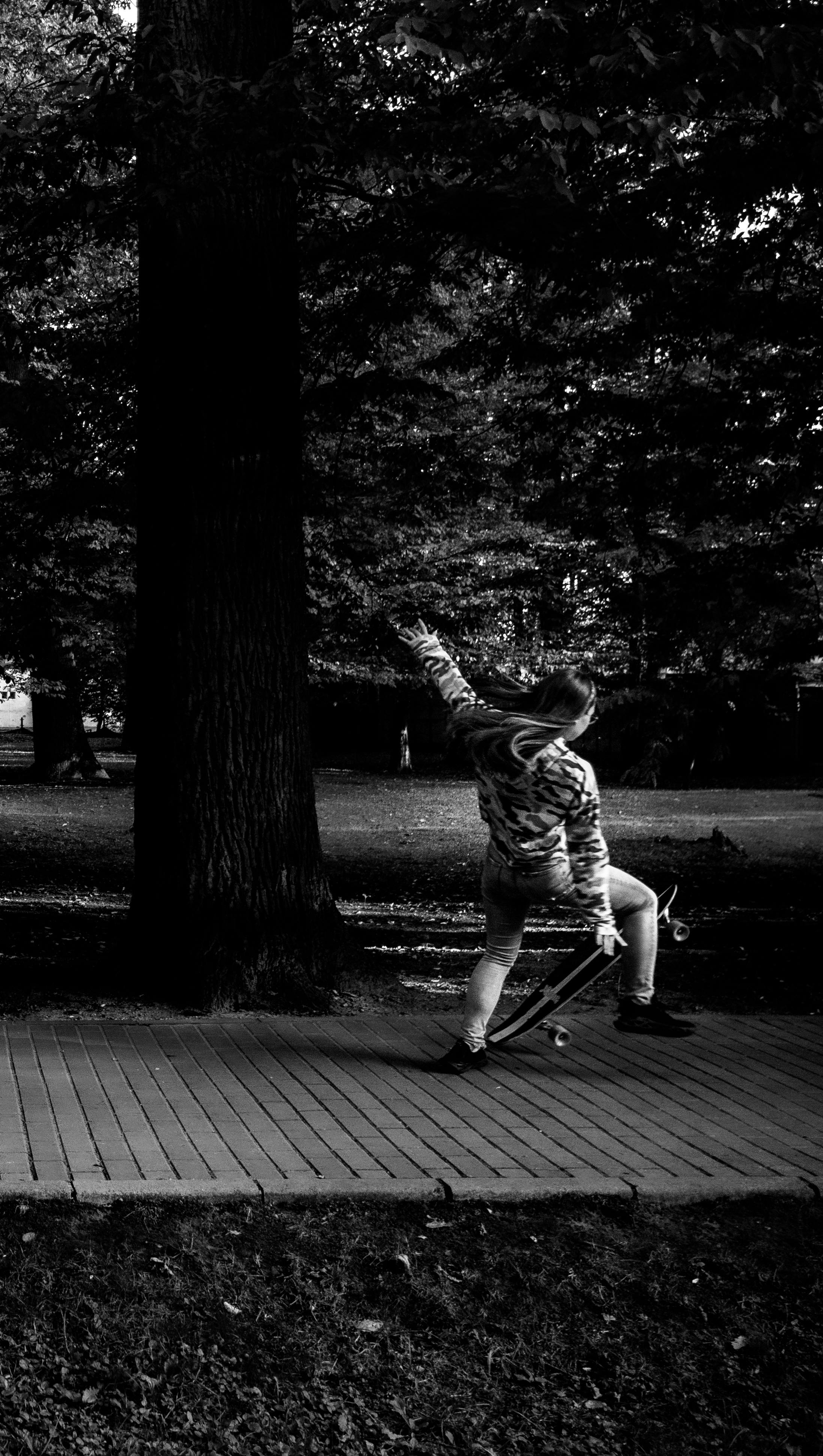 Grayscale Photo of Person Longboarding · Free Stock Photo