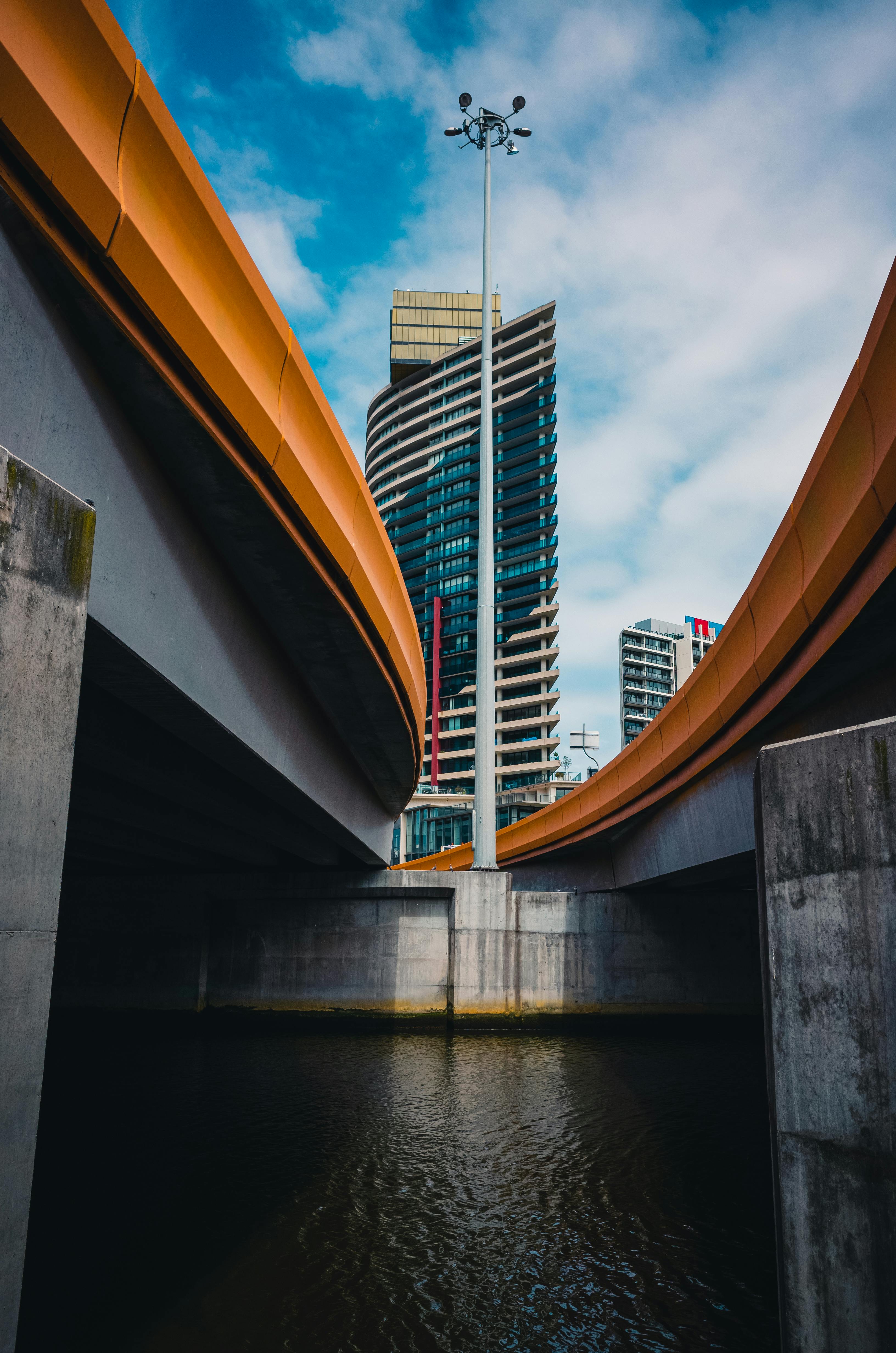 Modern Skyscrapers and Bridge over River · Free Stock Photo