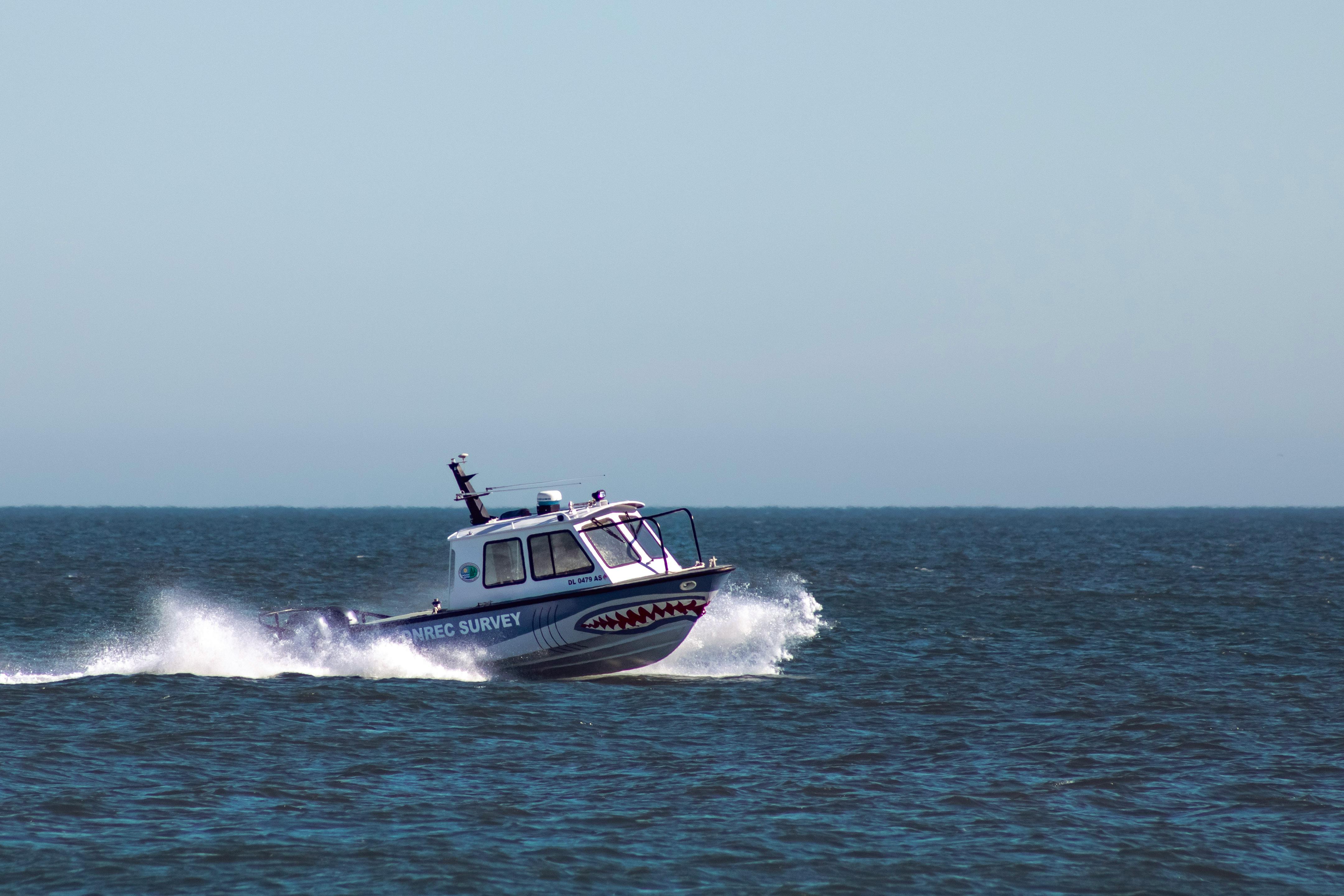 Couple on a Motorboat · Free Stock Photo