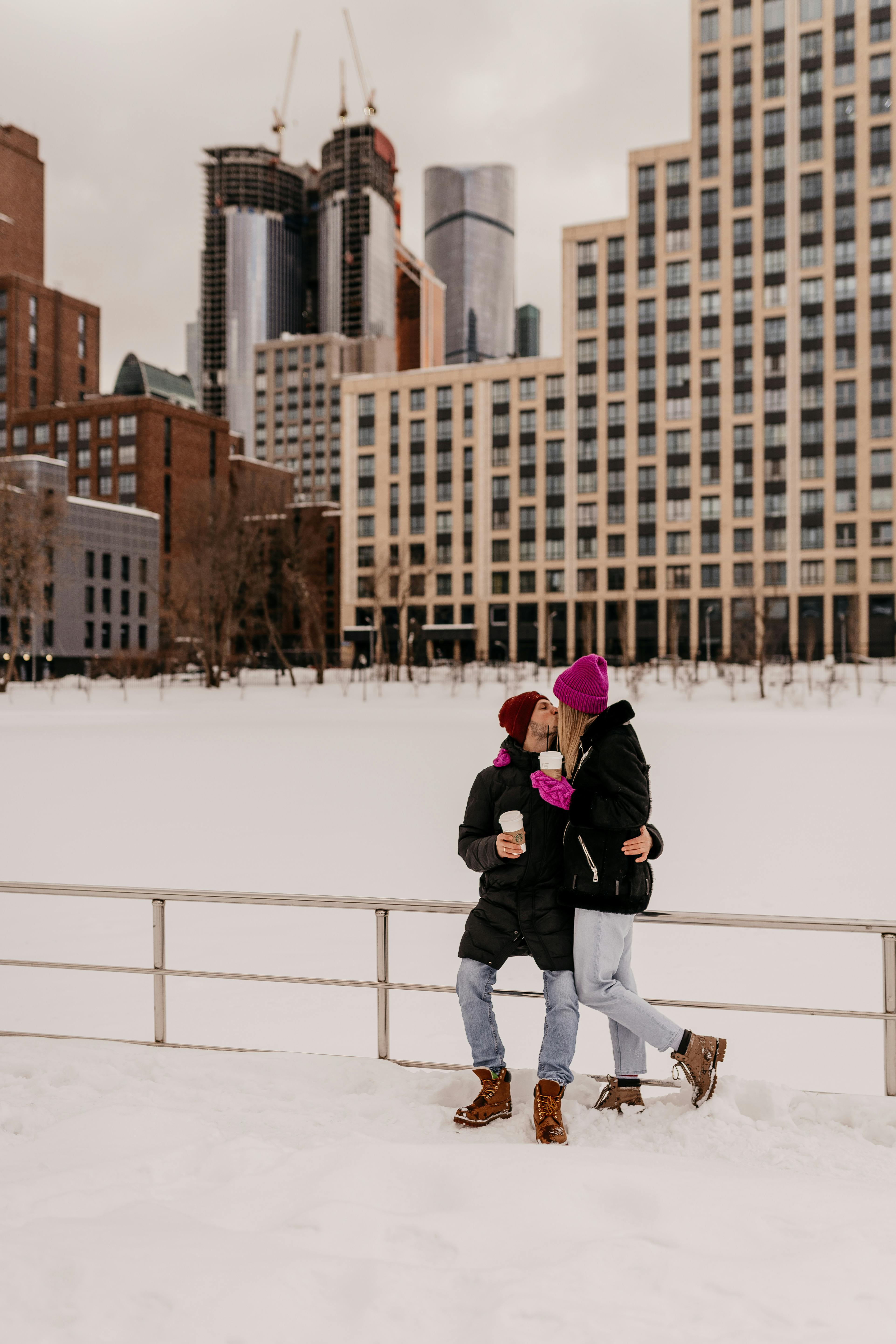 Man and Woman Sitting Beside a Bonfire · Free Stock Photo