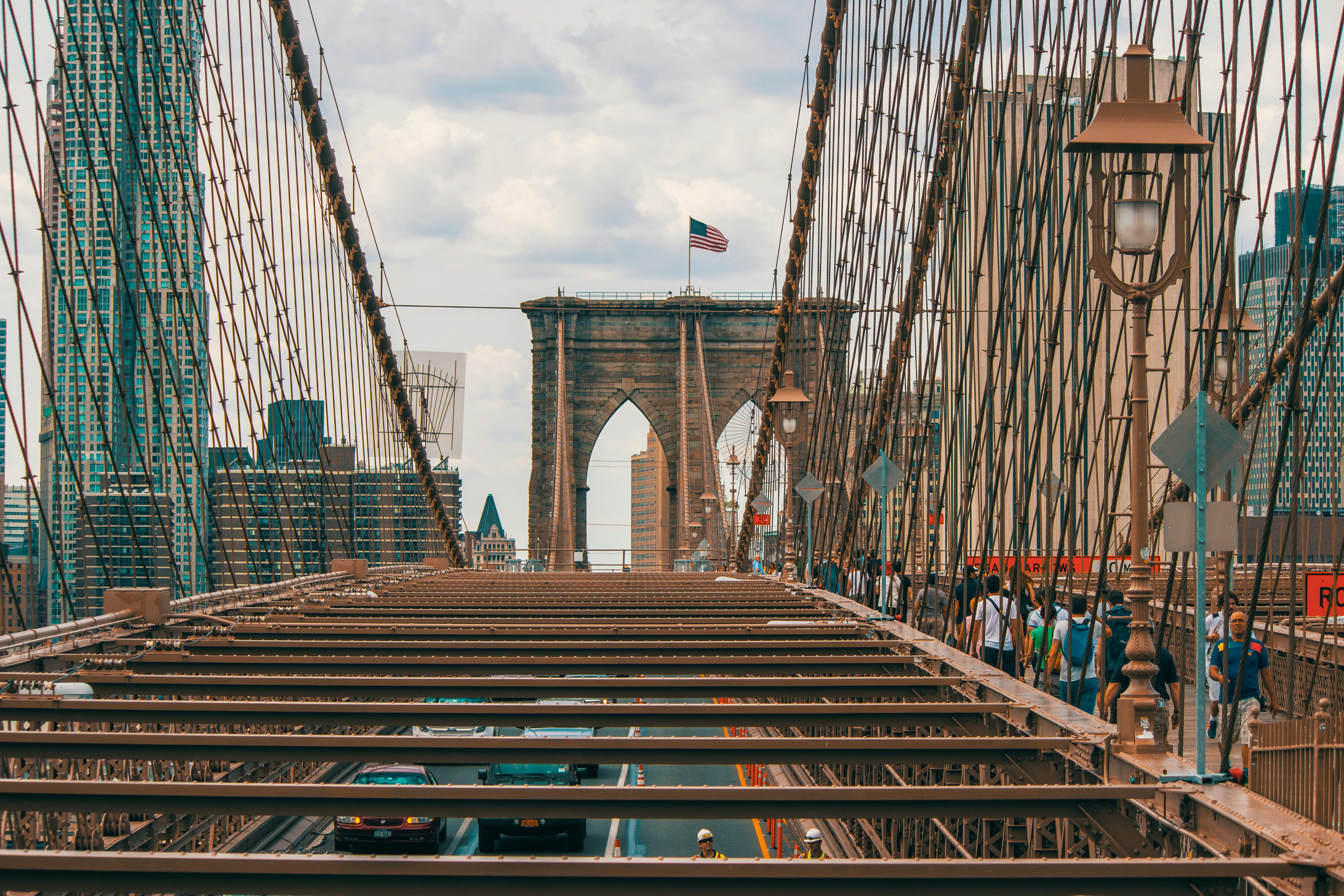 People Walking on Bridge · Free Stock Photo
