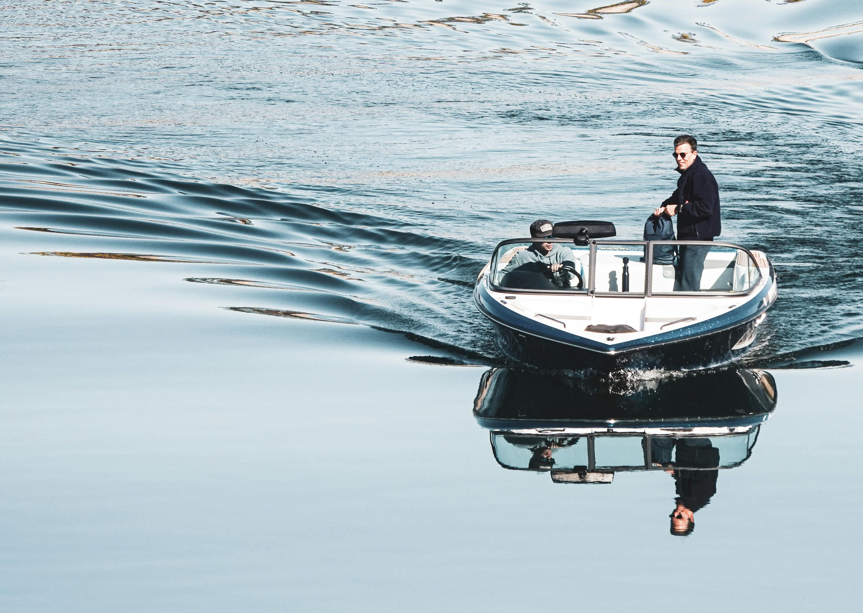 Men Riding a Speedboat · Free Stock Photo