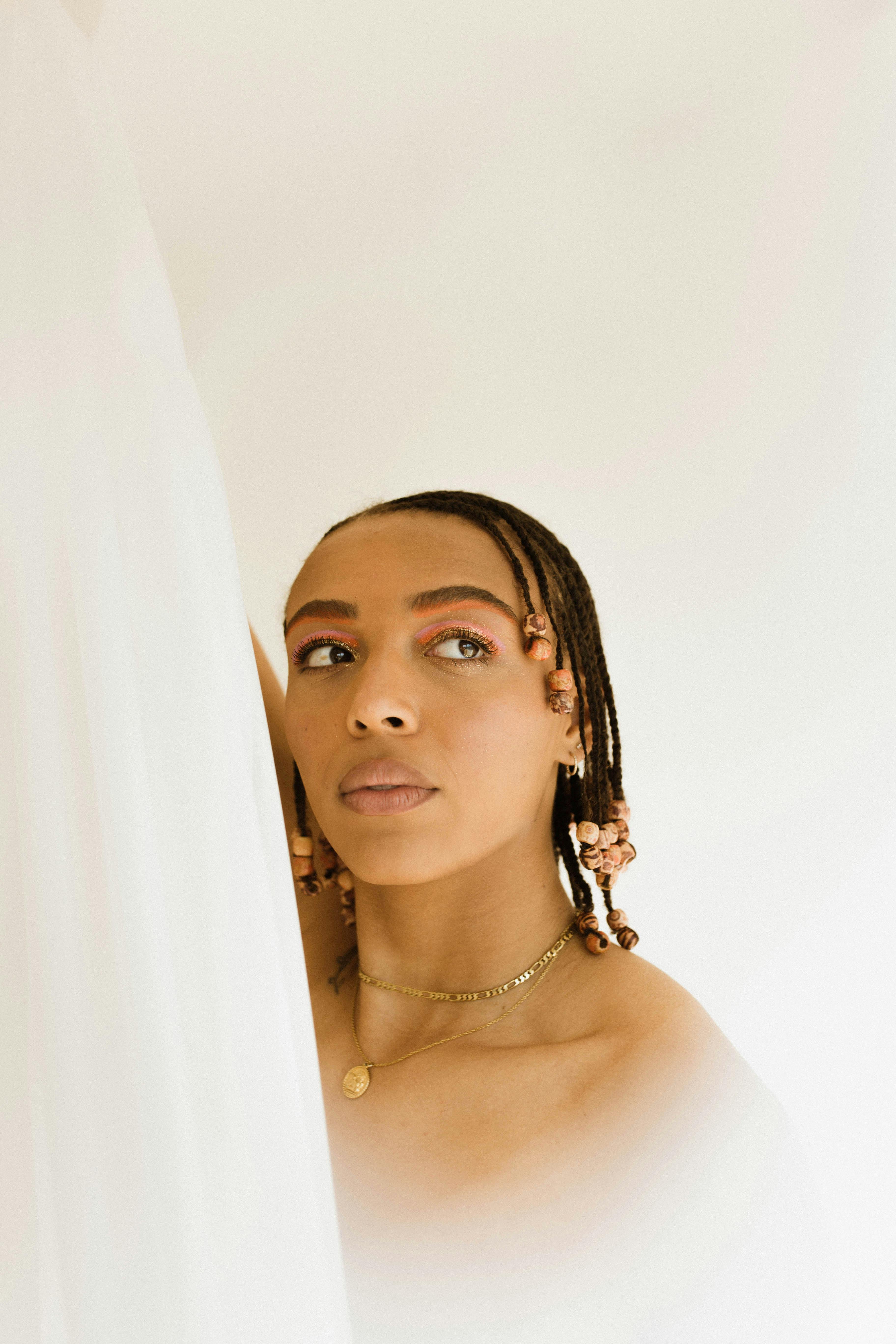 Woman in White Top Posing · Free Stock Photo