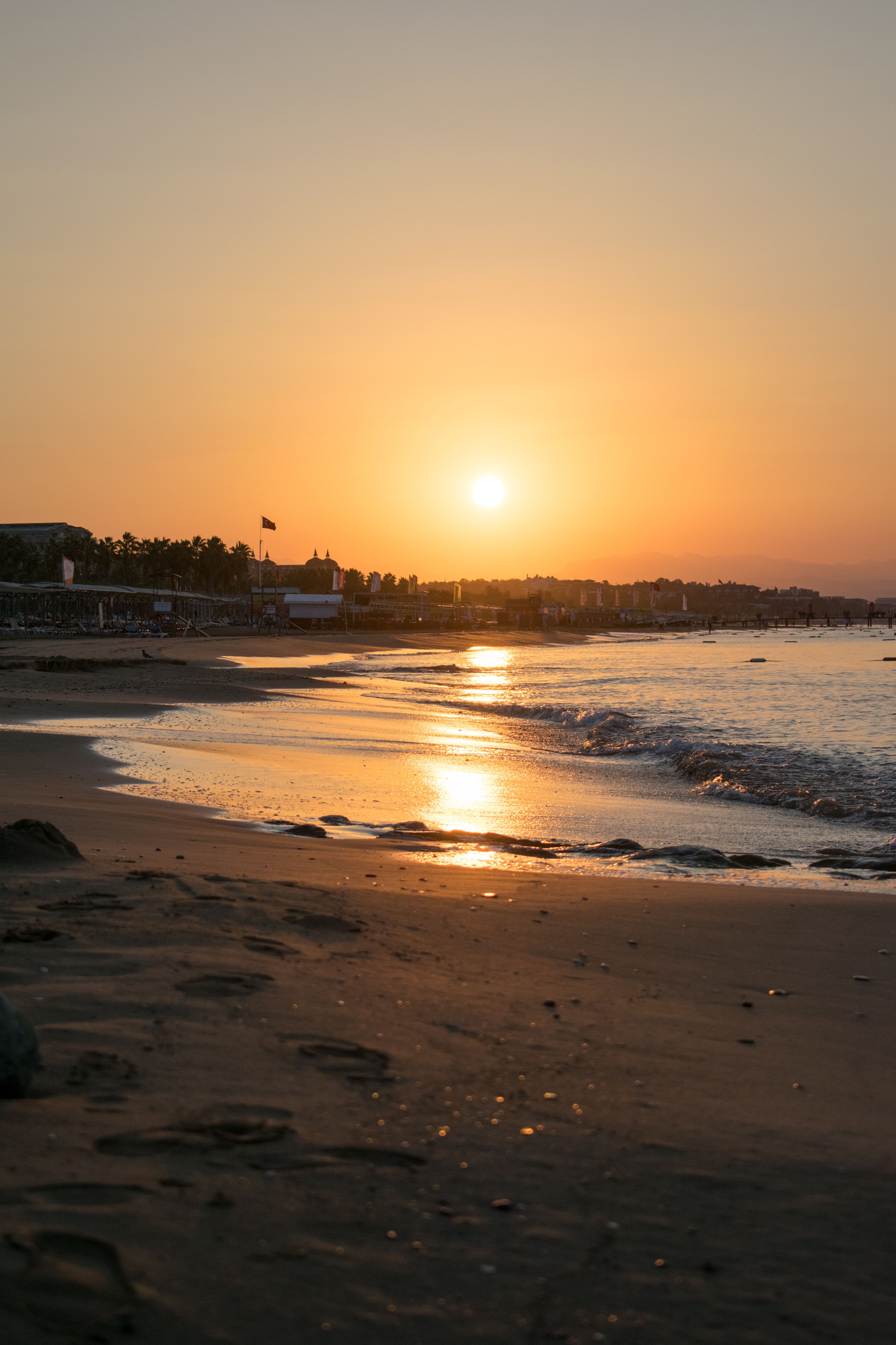 Sand on the Beach During Sunset · Free Stock Photo