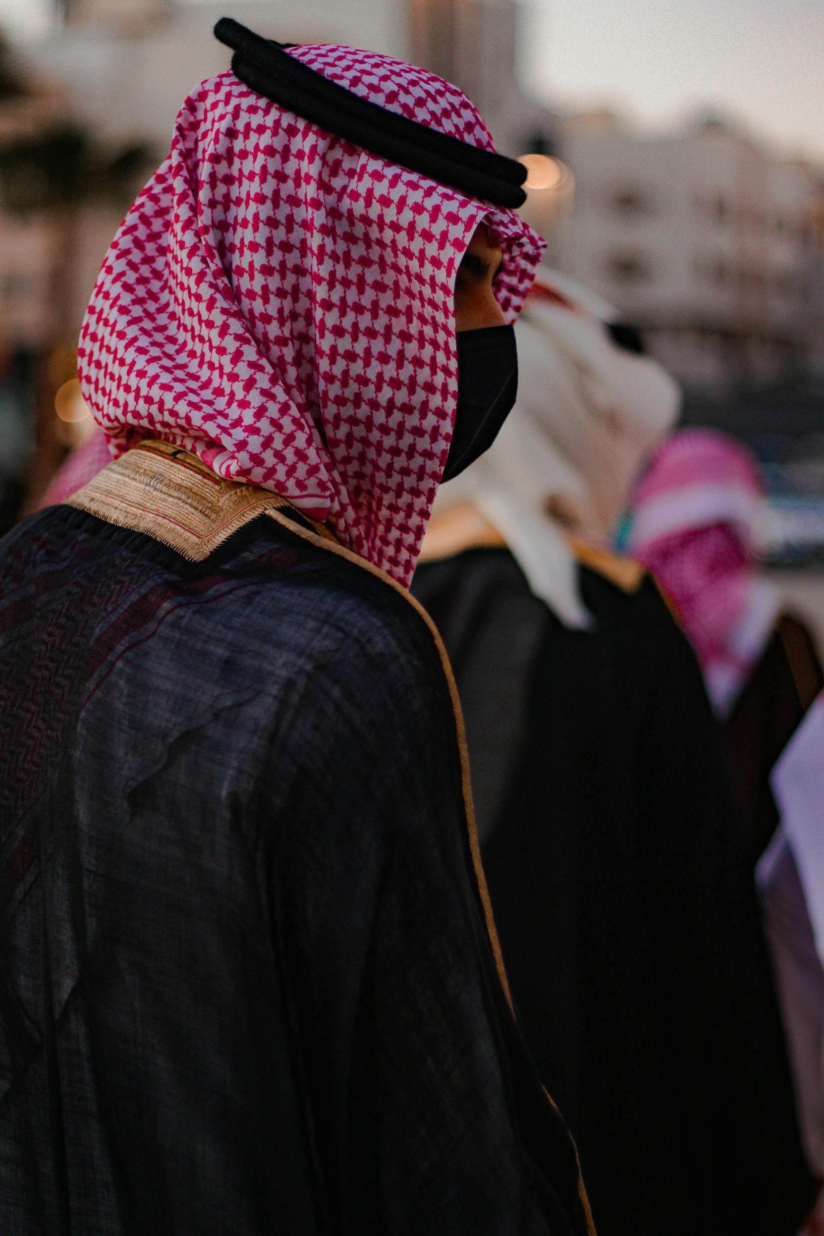 Back View of a Person Wearing Kaffiyeh · Free Stock Photo