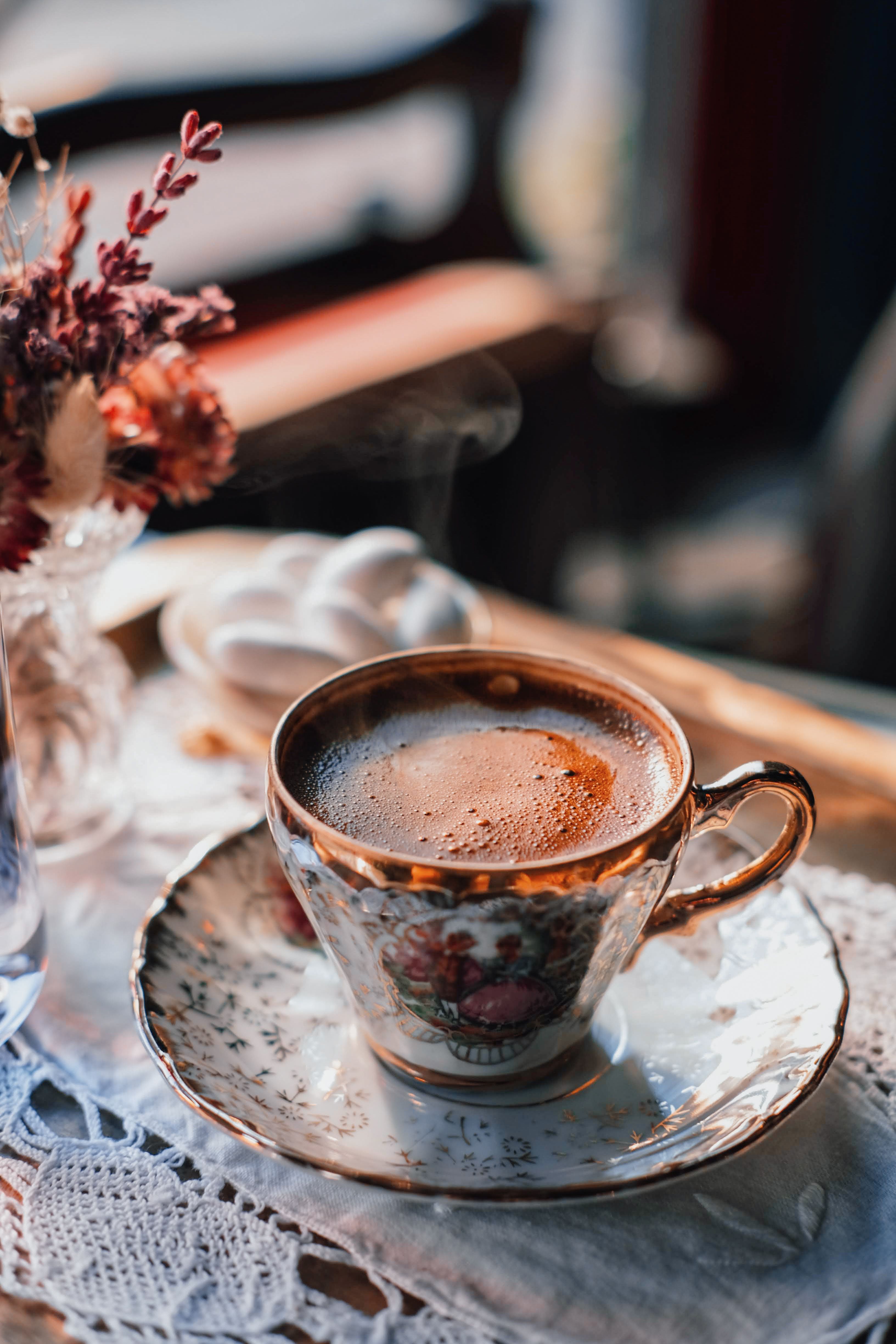 Drink in Glass and Chocolate on Table · Free Stock Photo