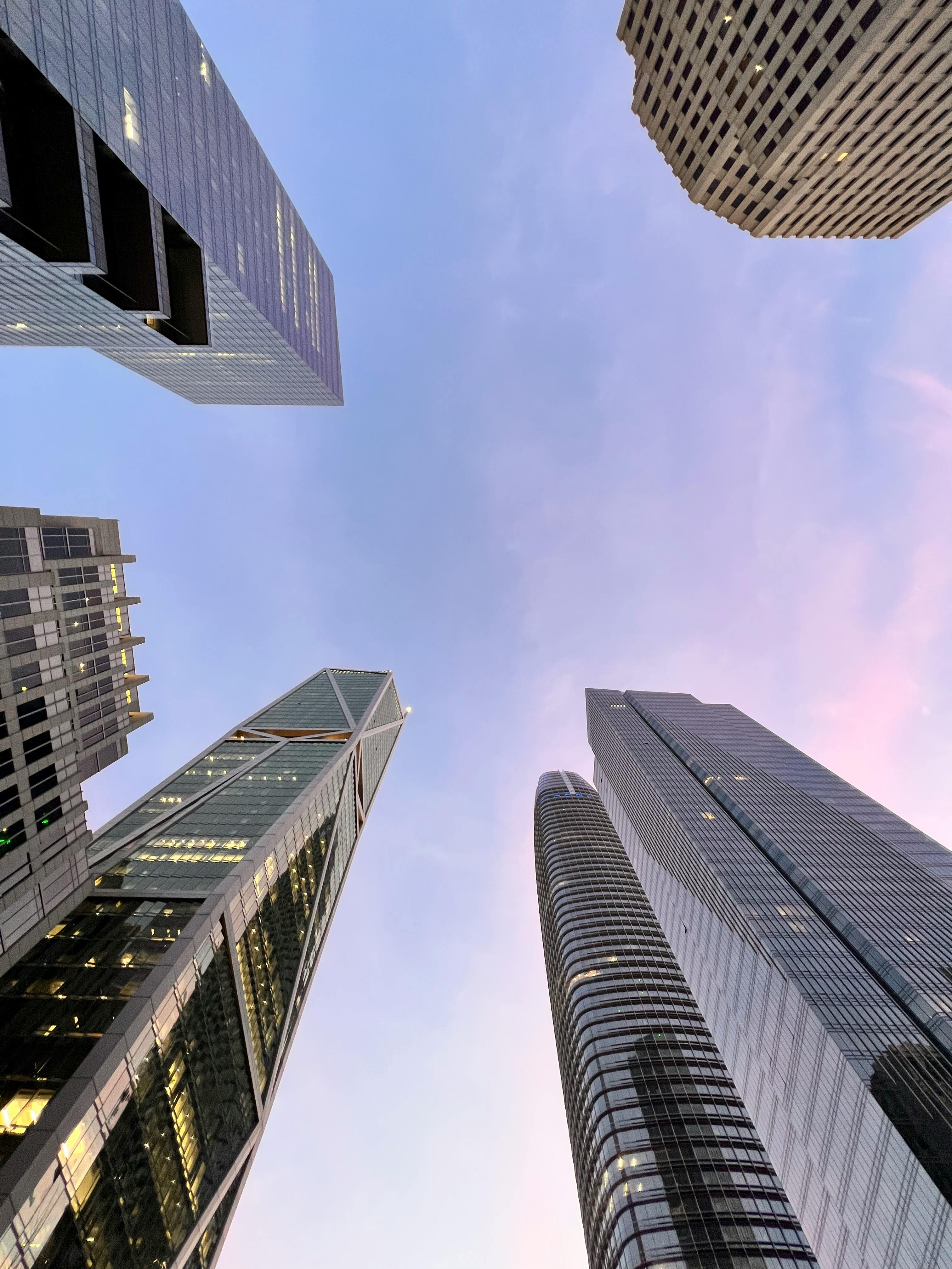 Photographing City Buildings with a Smartphone · Free Stock Photo