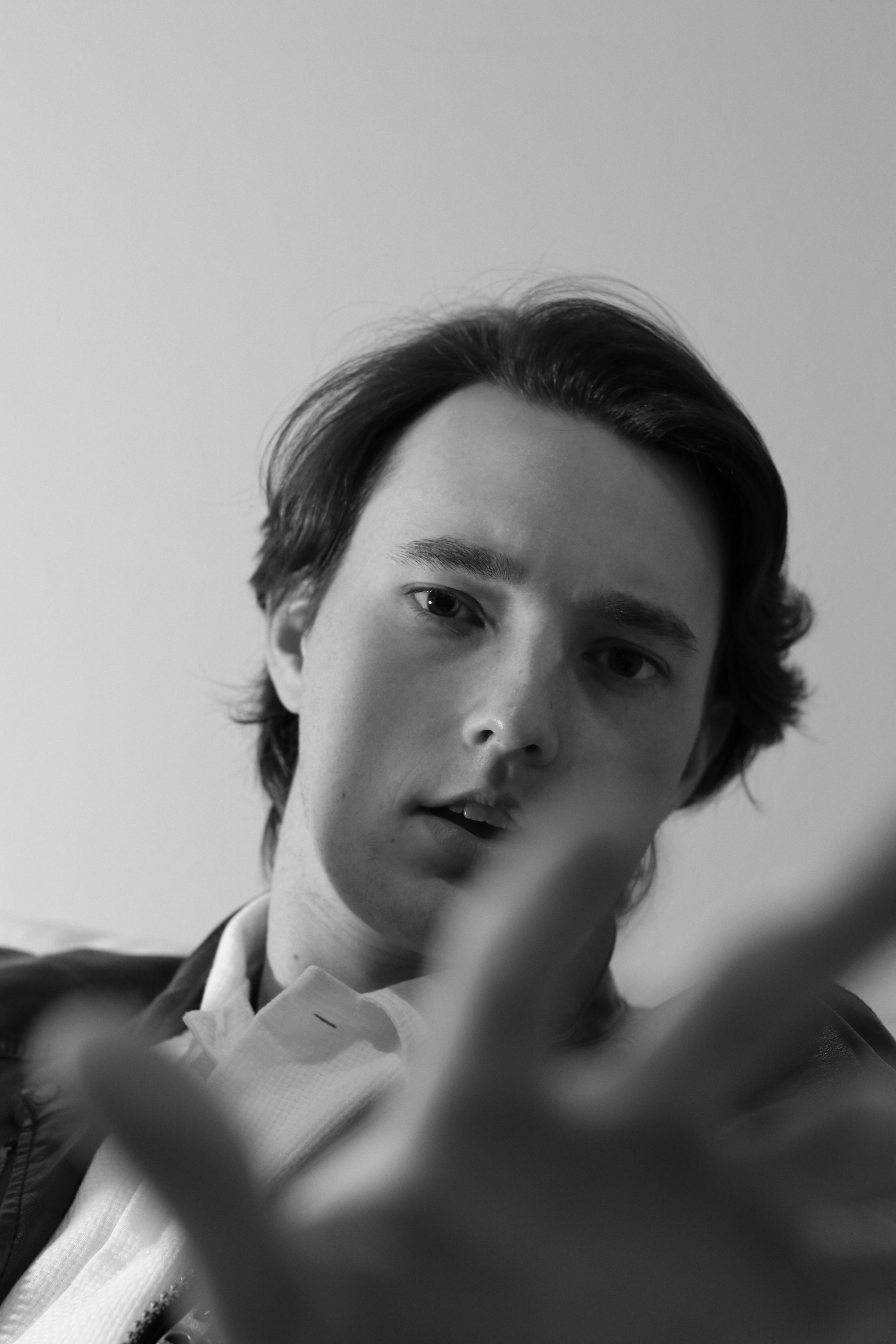 Grayscale Photo of a Man in Black Shirt · Free Stock Photo