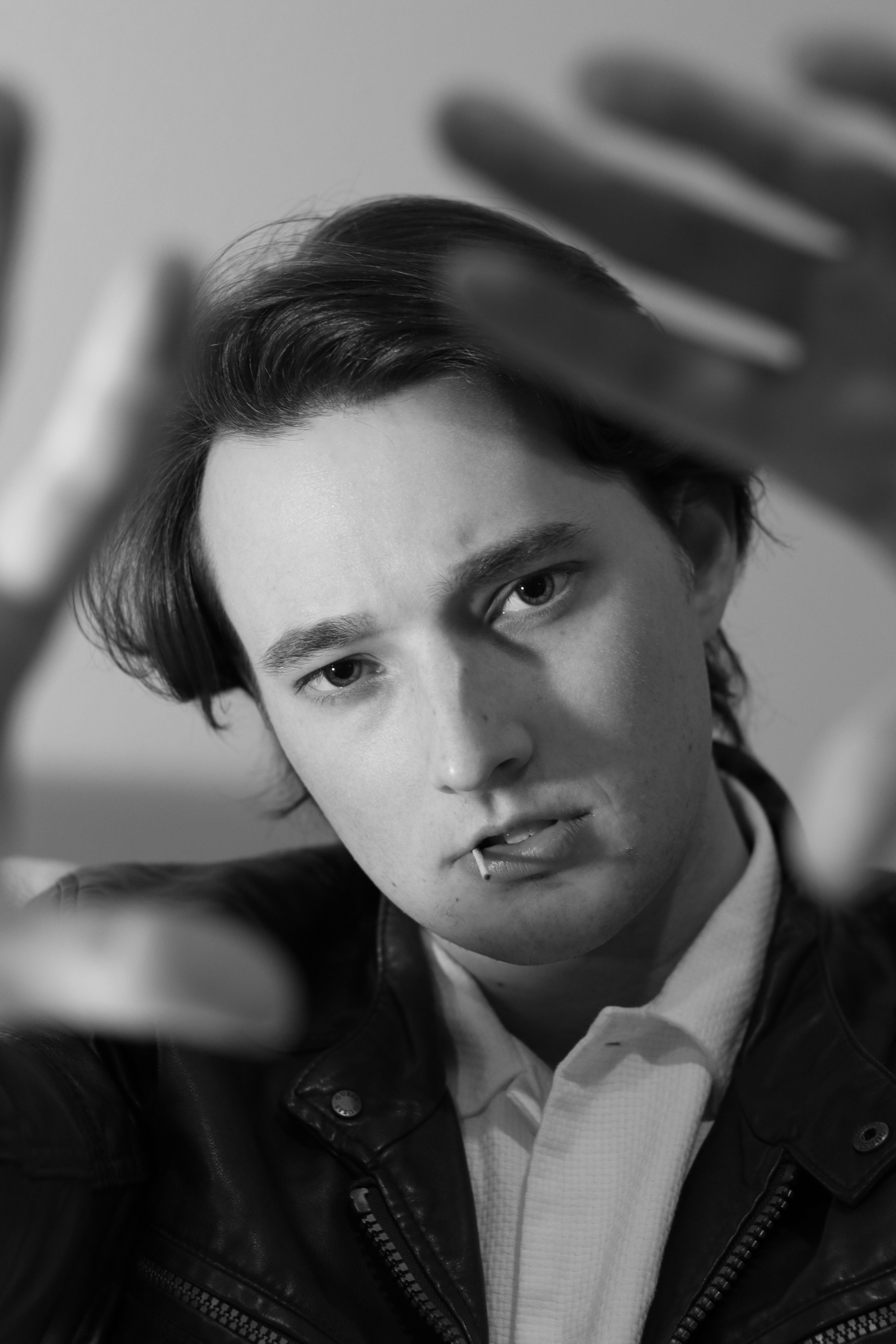 Grayscale Photo of a Man in Black Shirt · Free Stock Photo