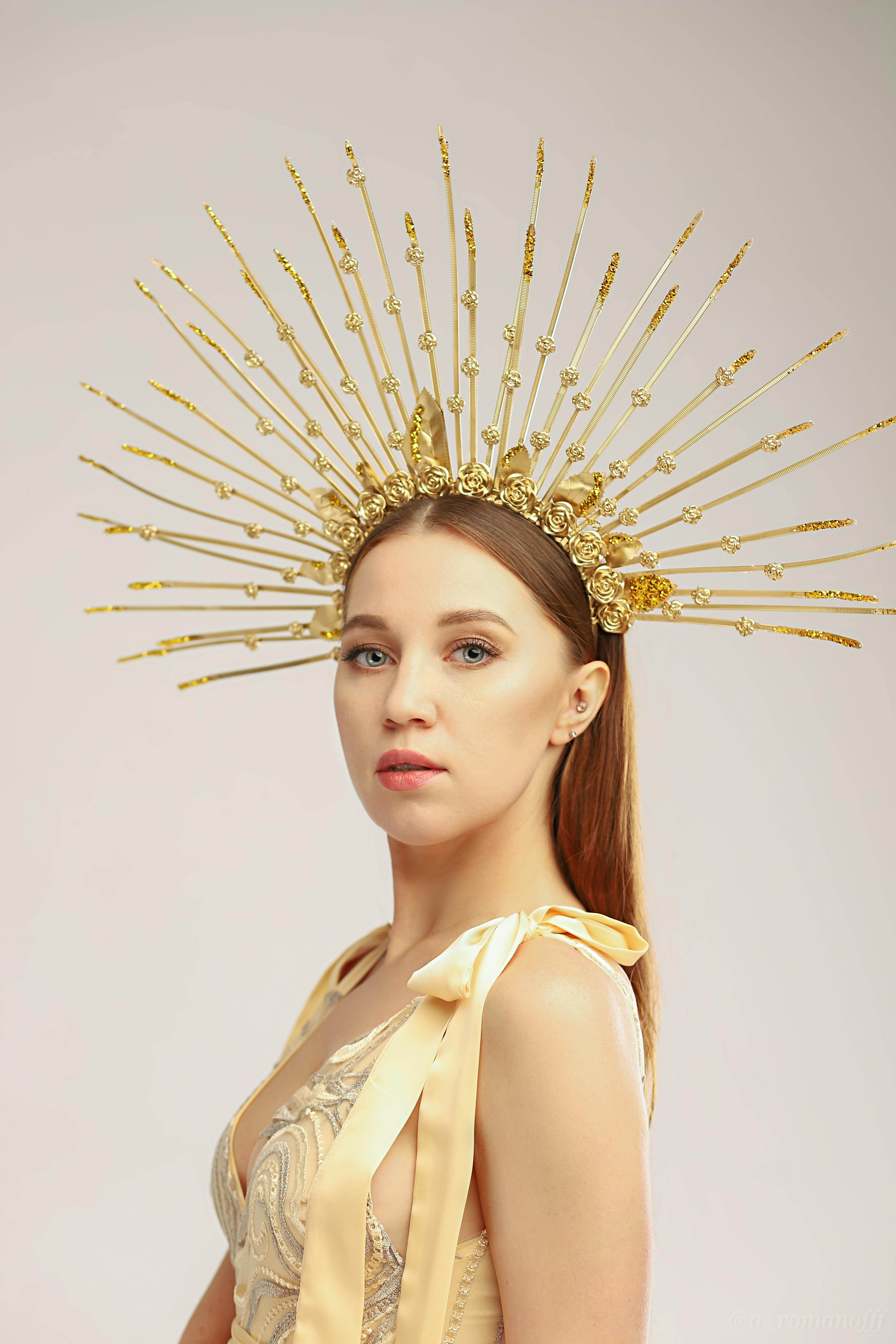 Model Wearing Spiky Gold Crown · Free Stock Photo