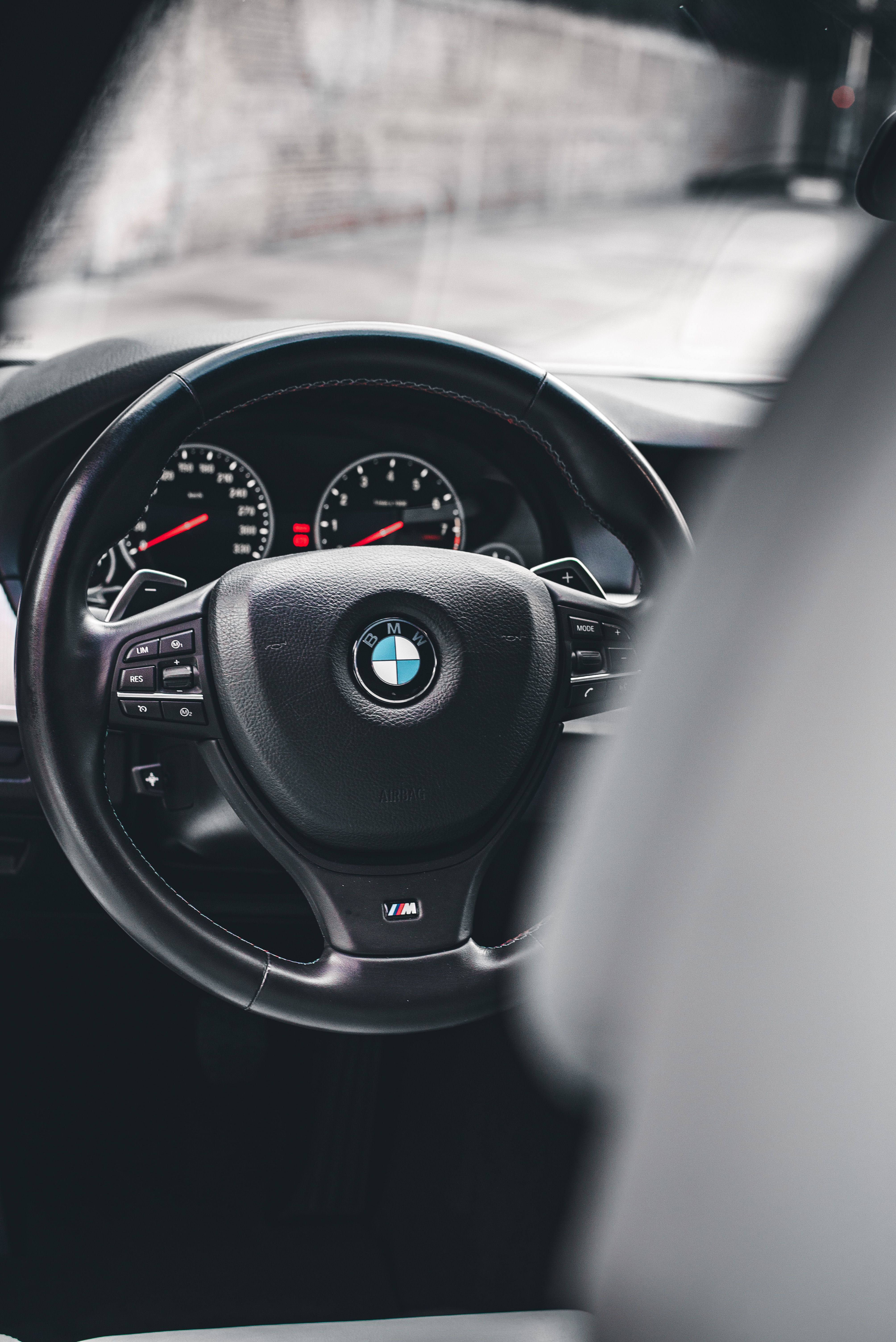 Close-up of Luxury Car Steering Wheel · Free Stock Photo