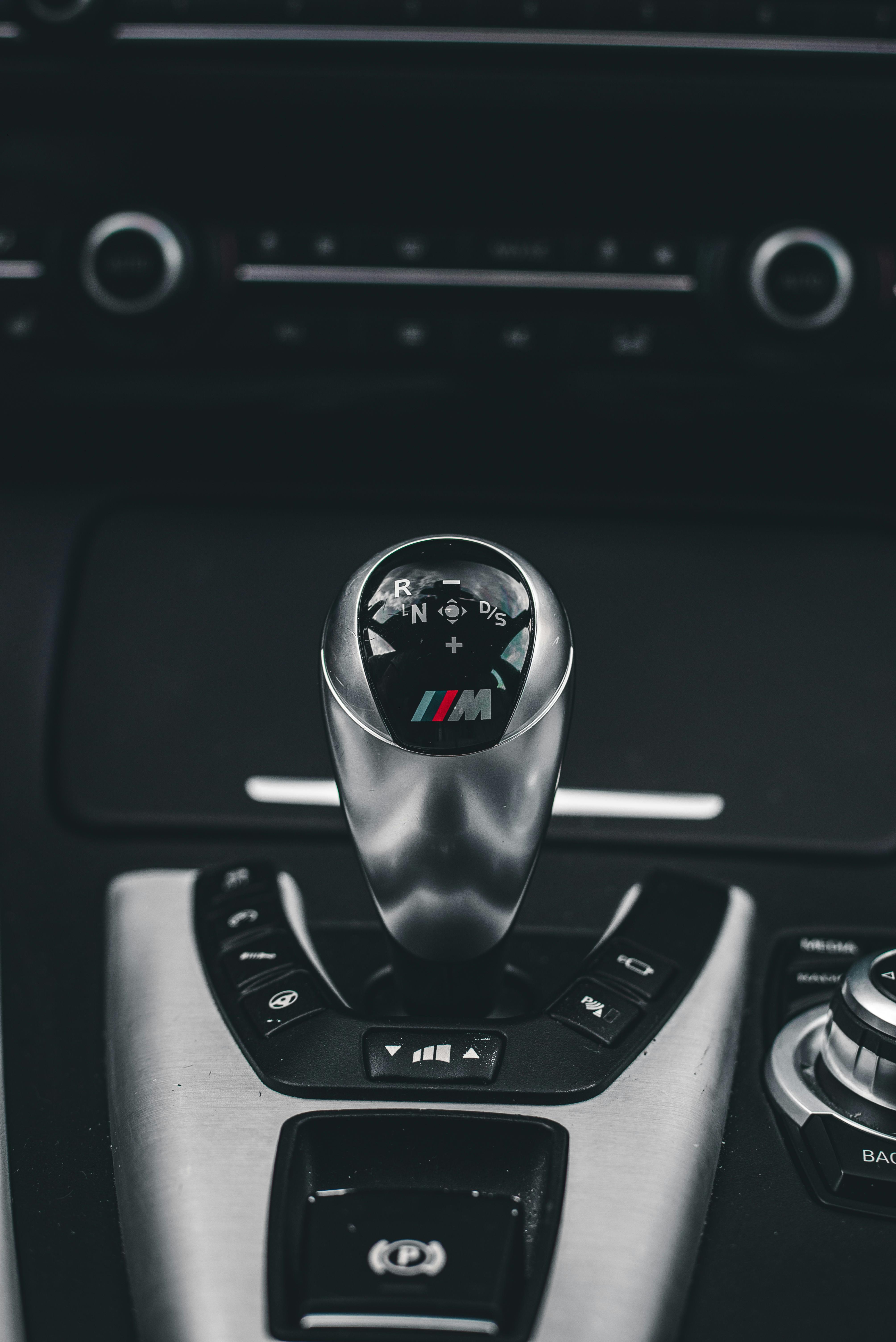 A Gray and Black Gear Selector of a Car · Free Stock Photo