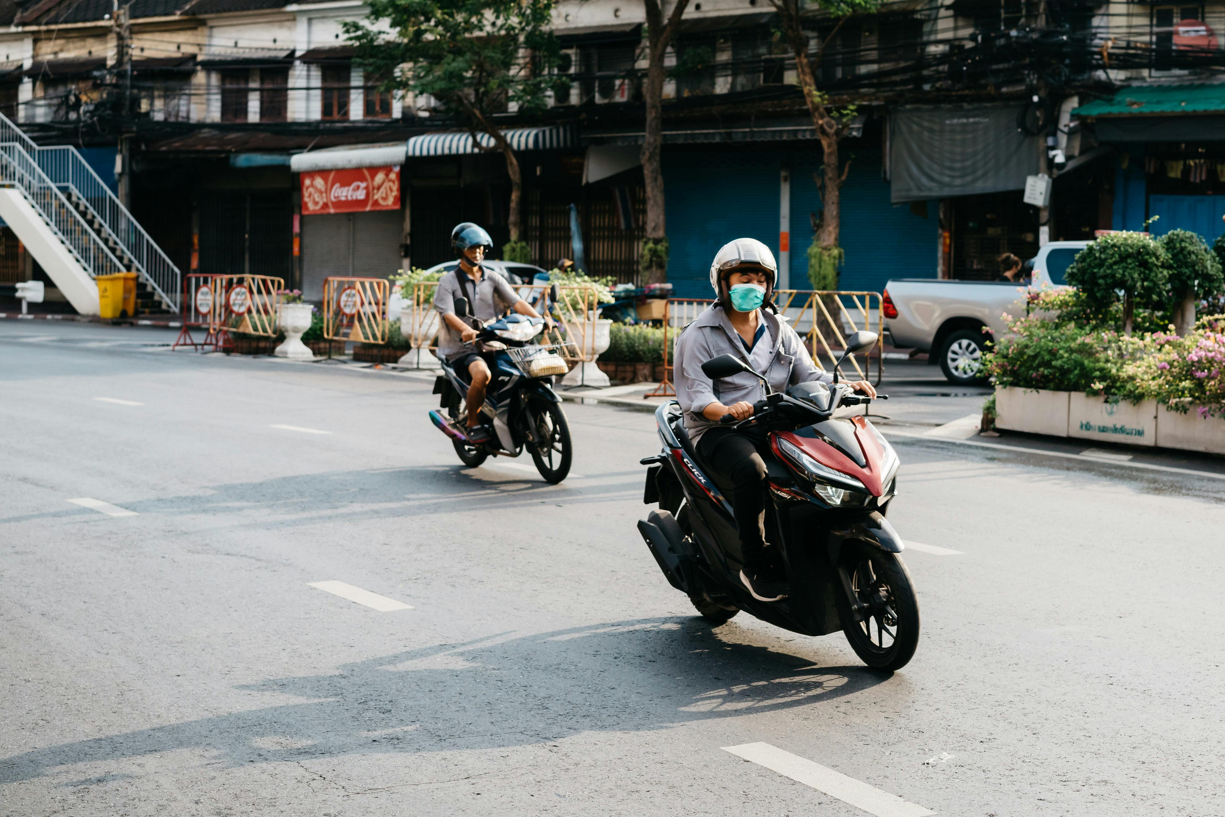Man Riding a Motorcycle · Free Stock Photo