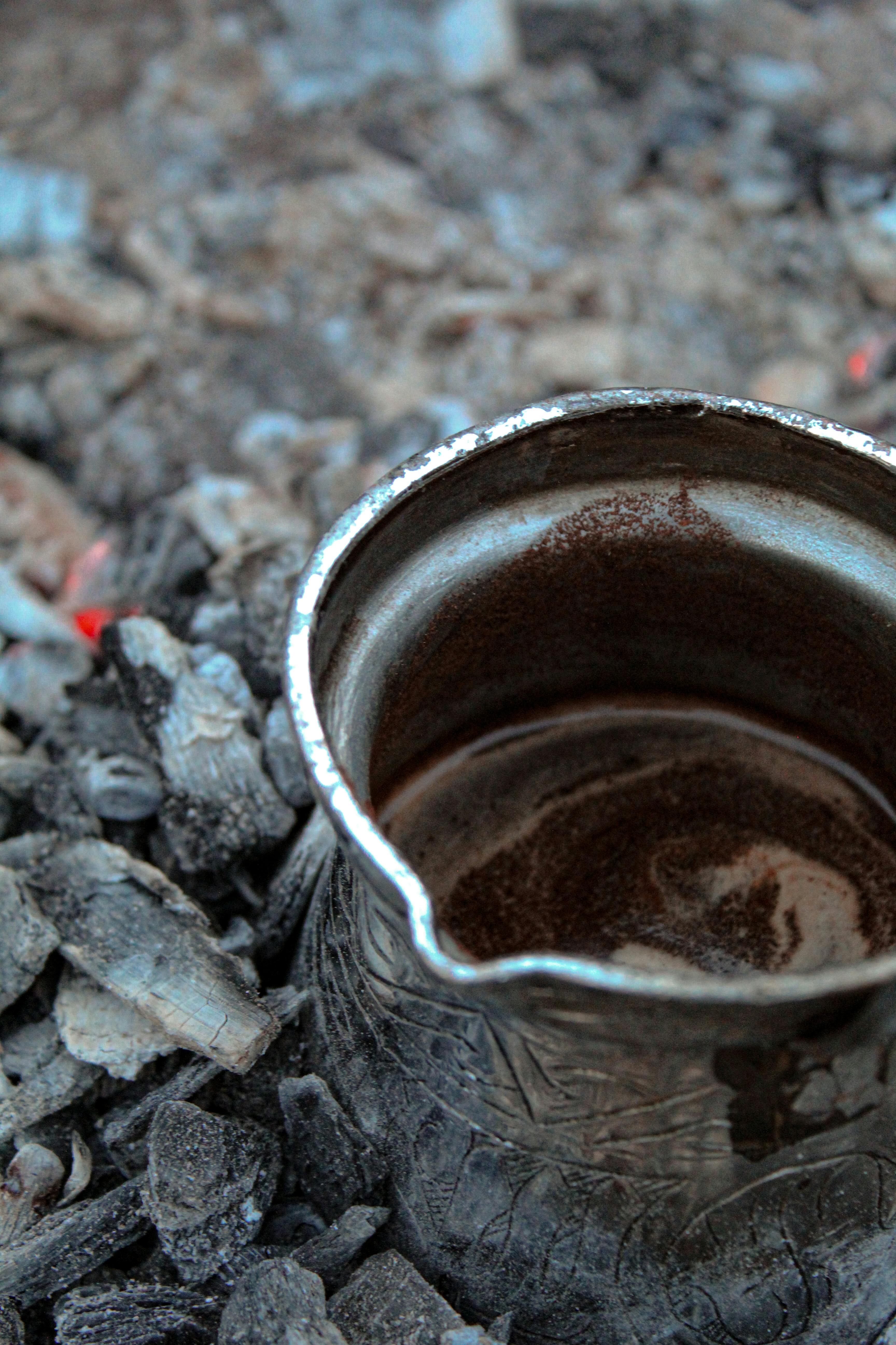 Silver Metal Pot on Black Charcoals · Free Stock Photo