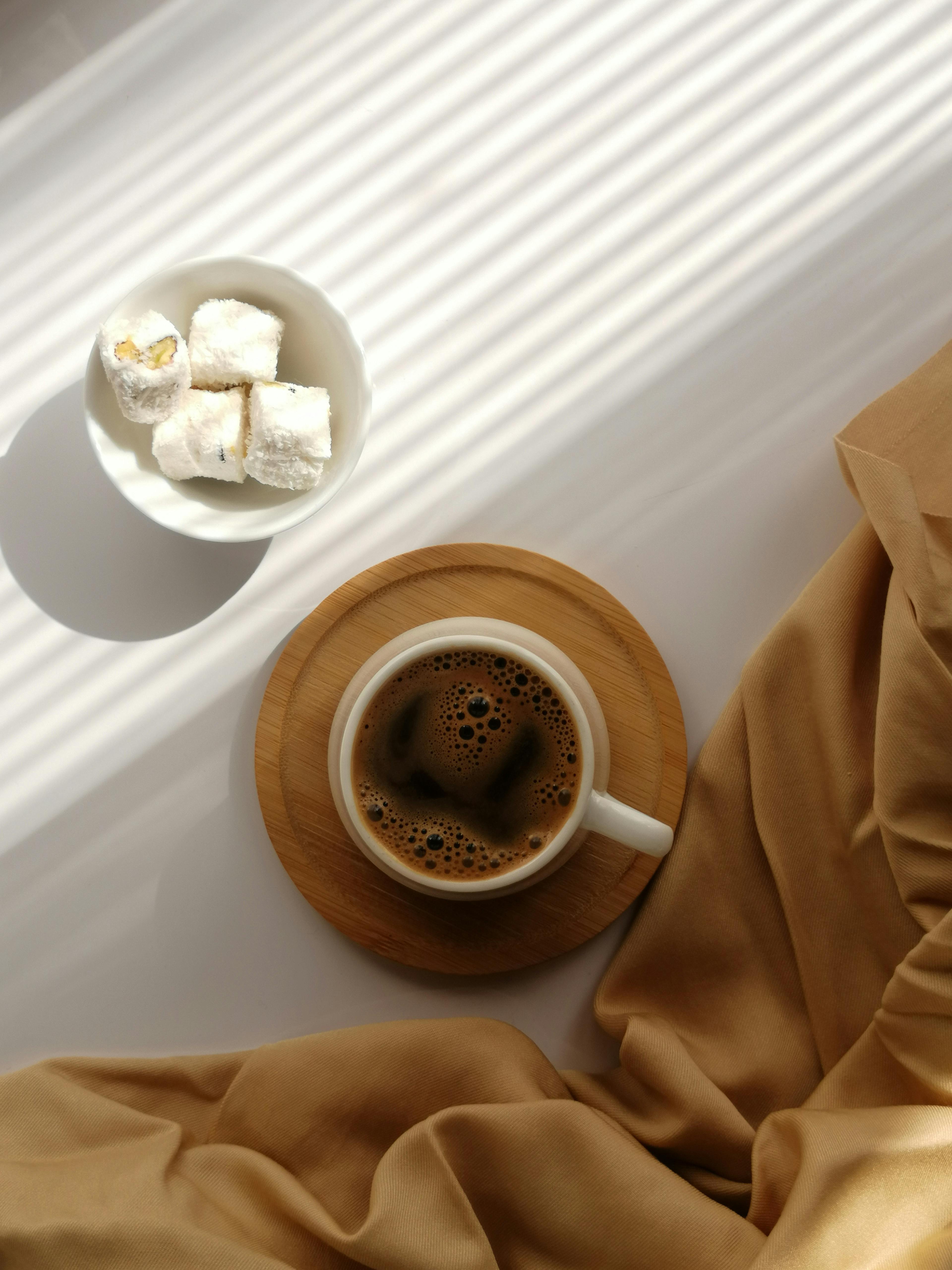 Top View of Coffee and Flowers · Free Stock Photo