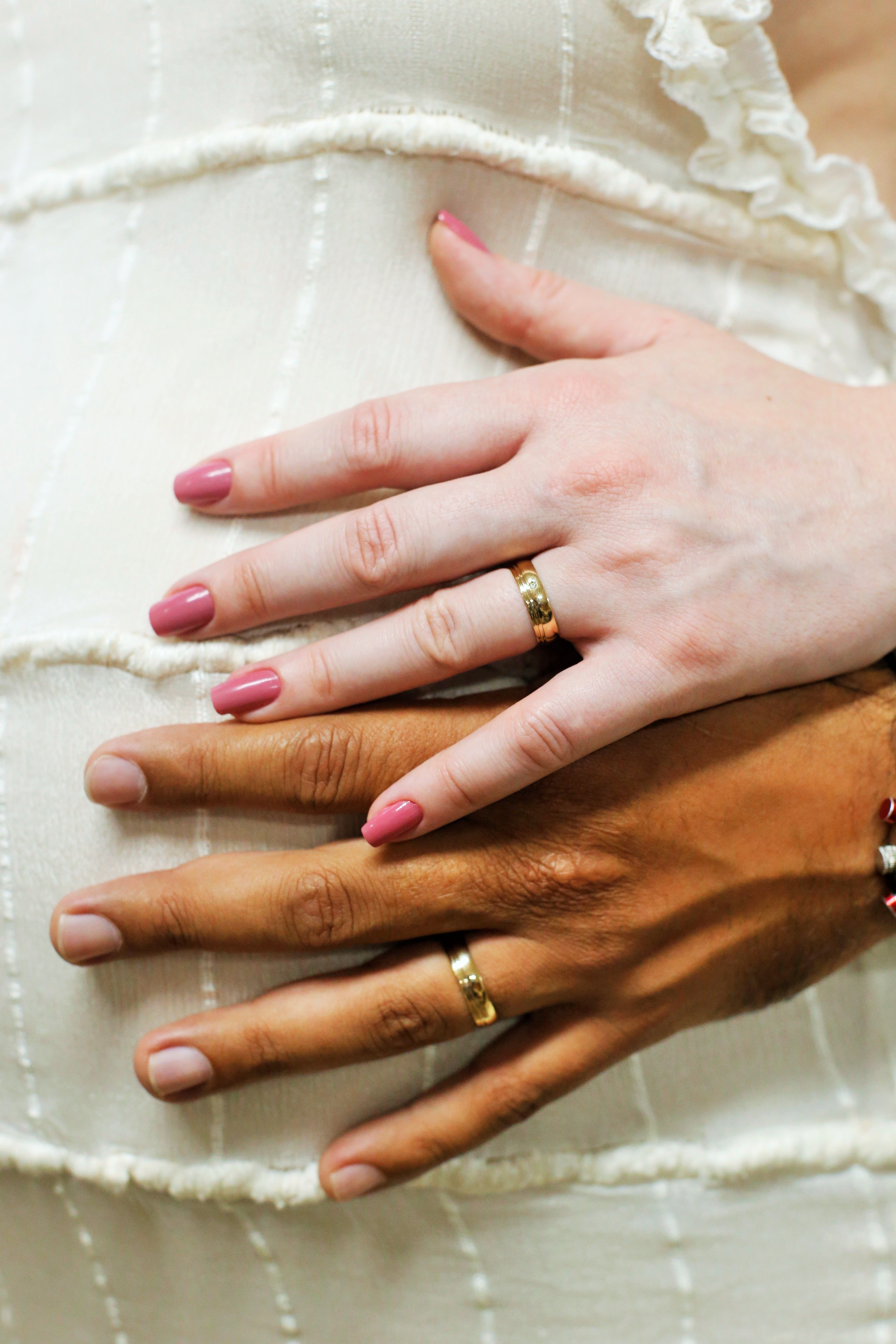 Hands with Wedding Bands · Free Stock Photo